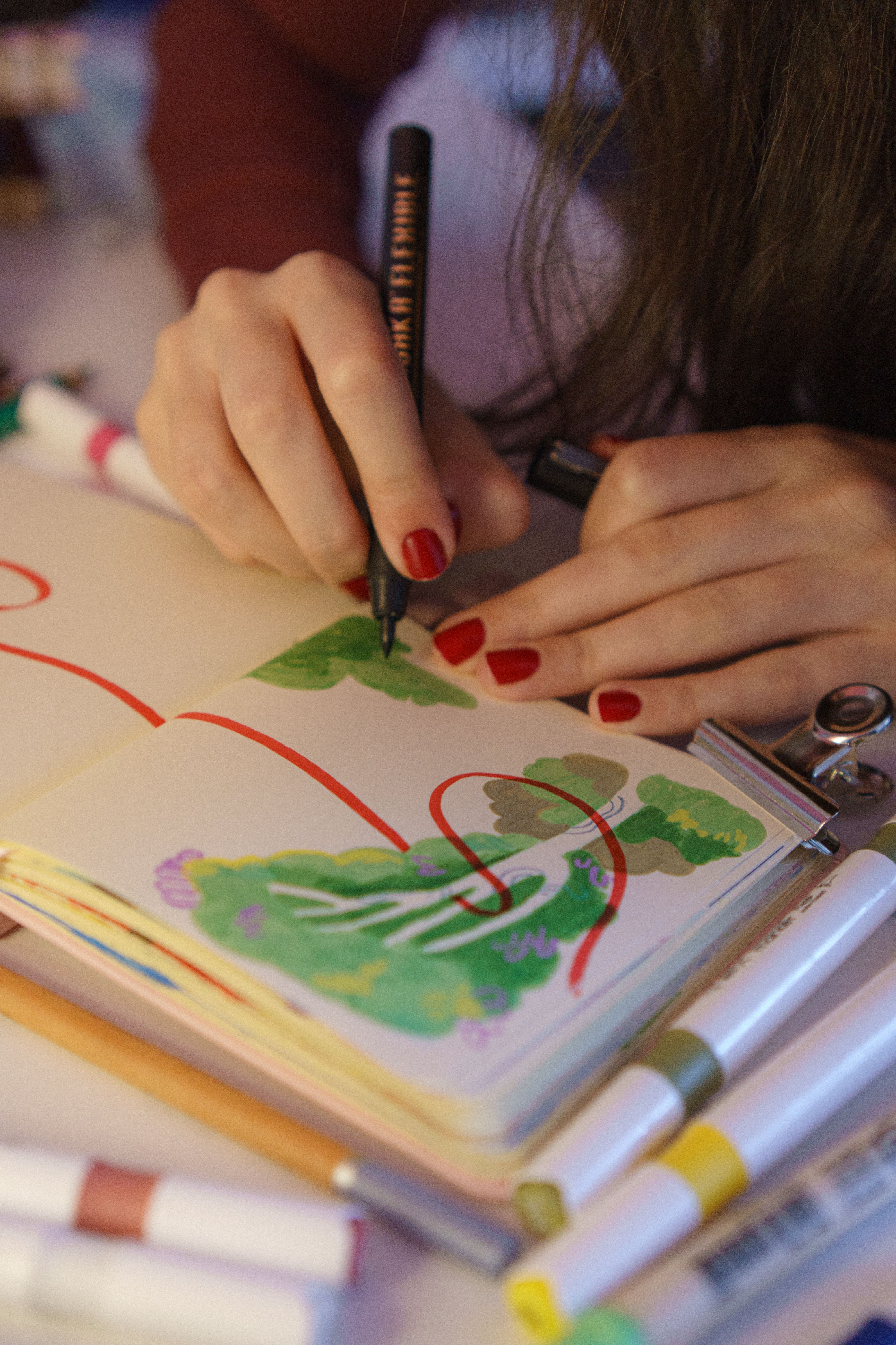 Creative Journal Artistry with Vibrant Markers · Free Stock Photo