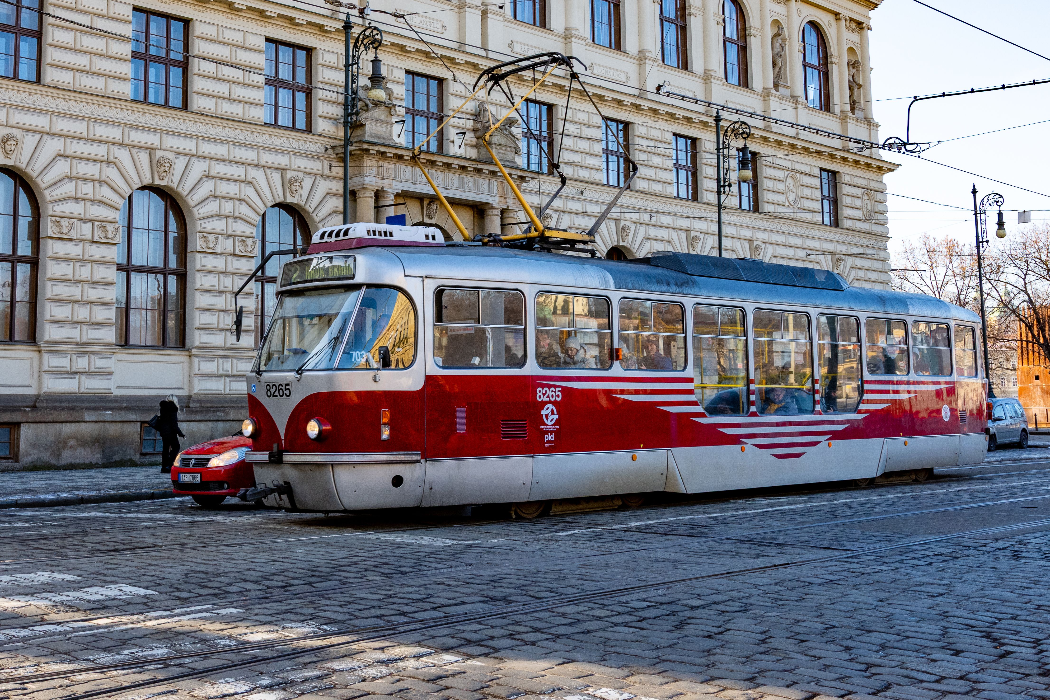 Historic Tram in Prague's Urban Street Setting · Free Stock Photo