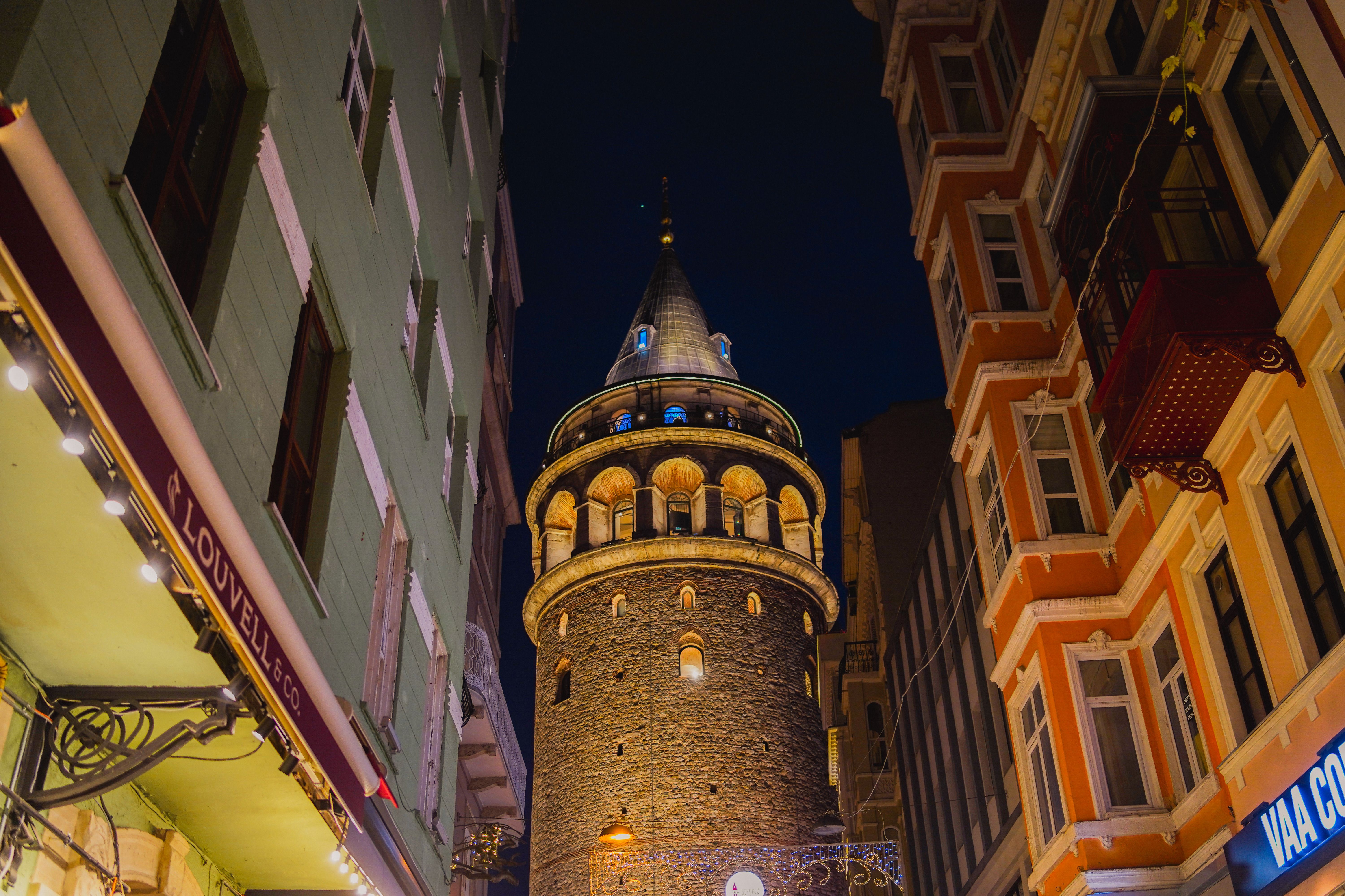 Galata Tower lit at night in Istanbul · Free Stock Photo