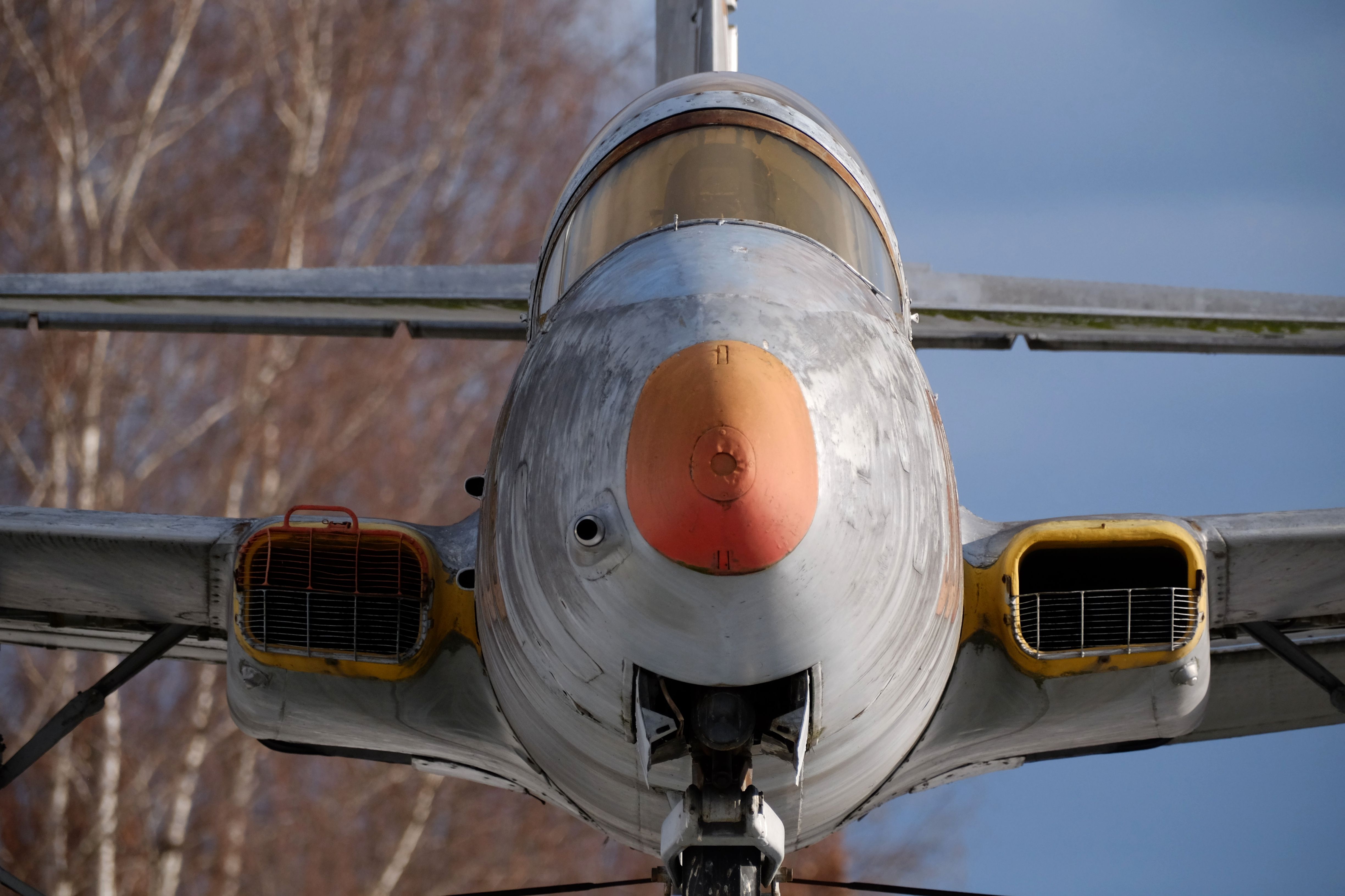 Front View of Vintage Military Aircraft Against Sky · Free Stock Photo