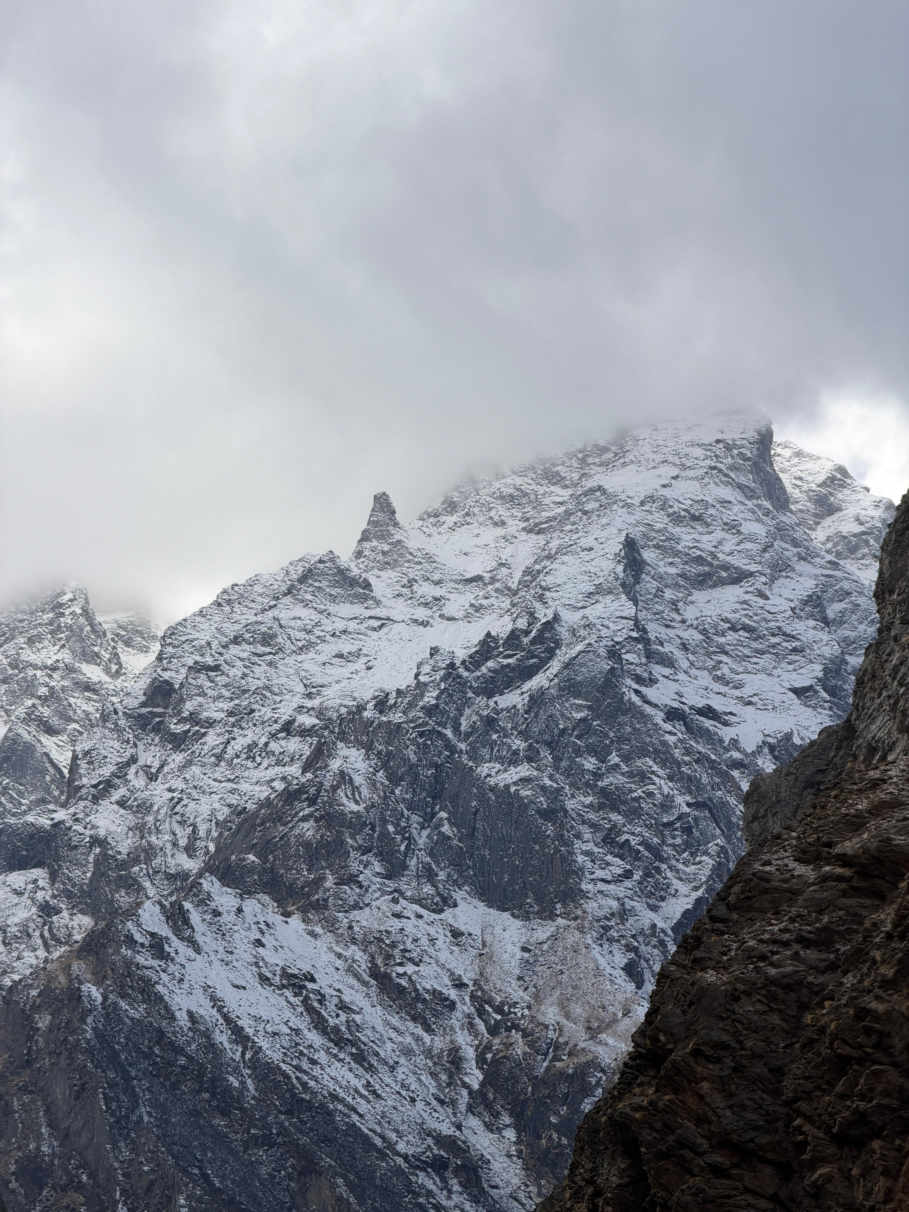 Snow-Capped Mountain in Overcast Weather · Free Stock Photo