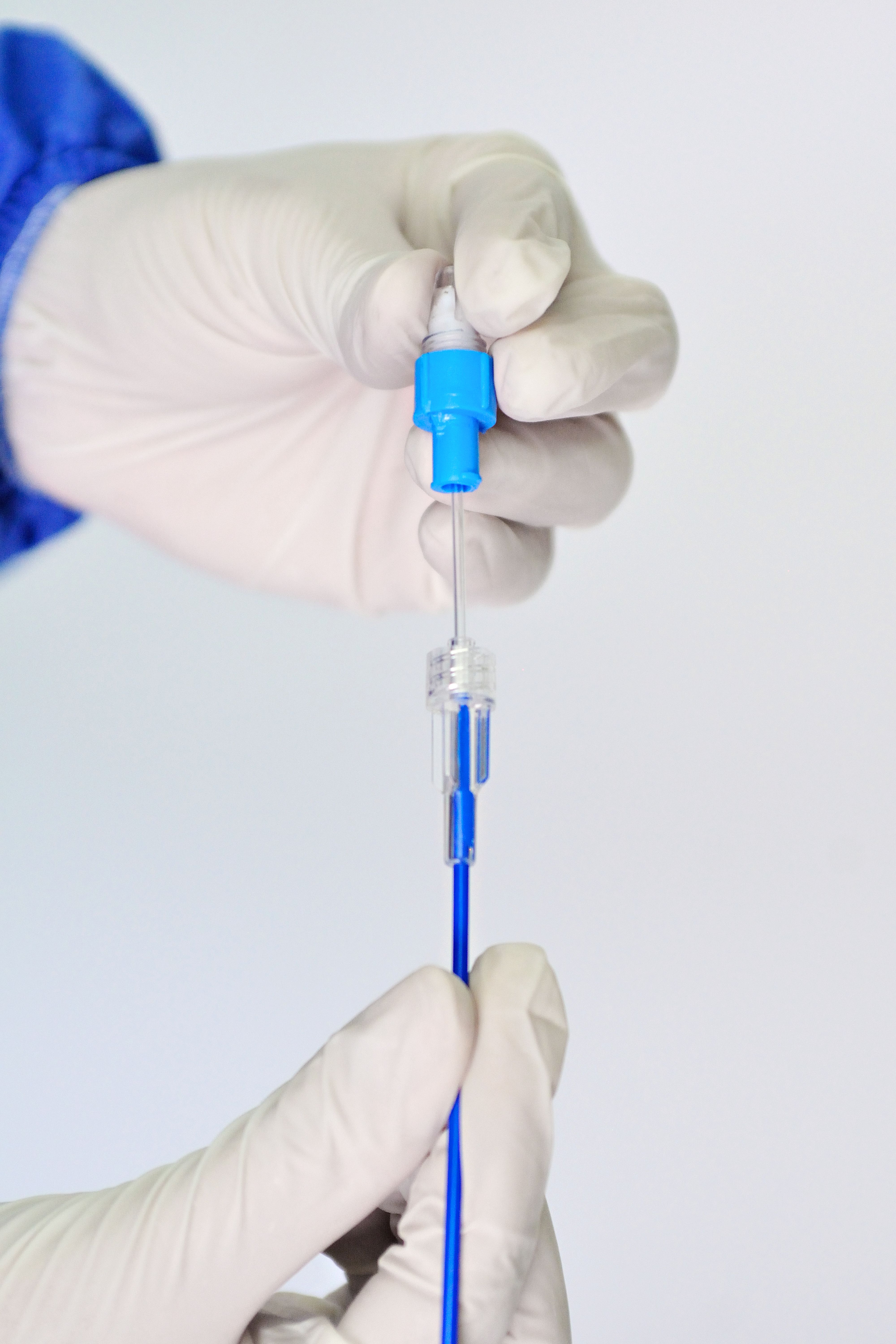 Medical Professional Handling a Catheter · Free Stock Photo