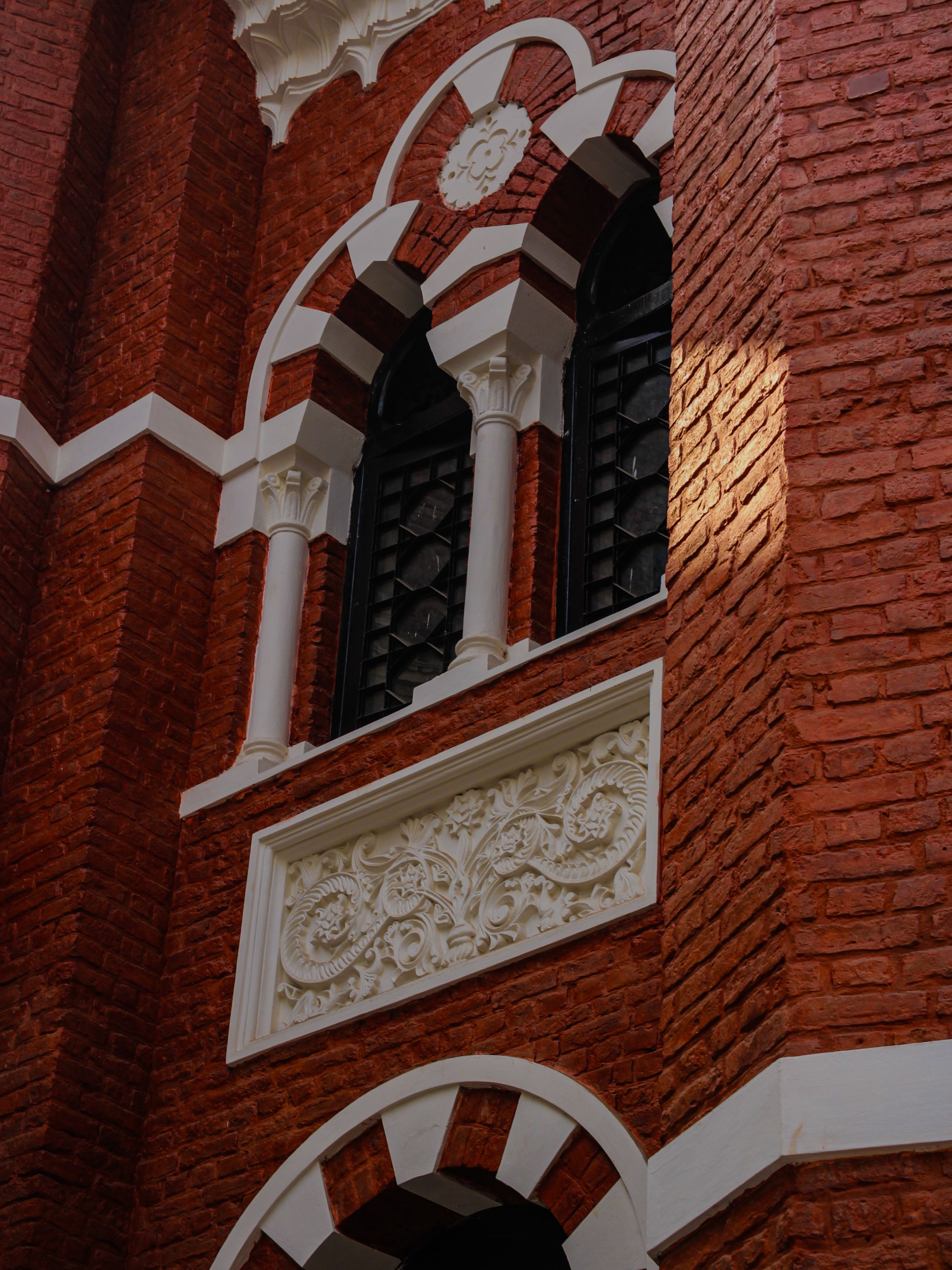 Historic Red Brick Architecture with Arched Windows · Free Stock Photo