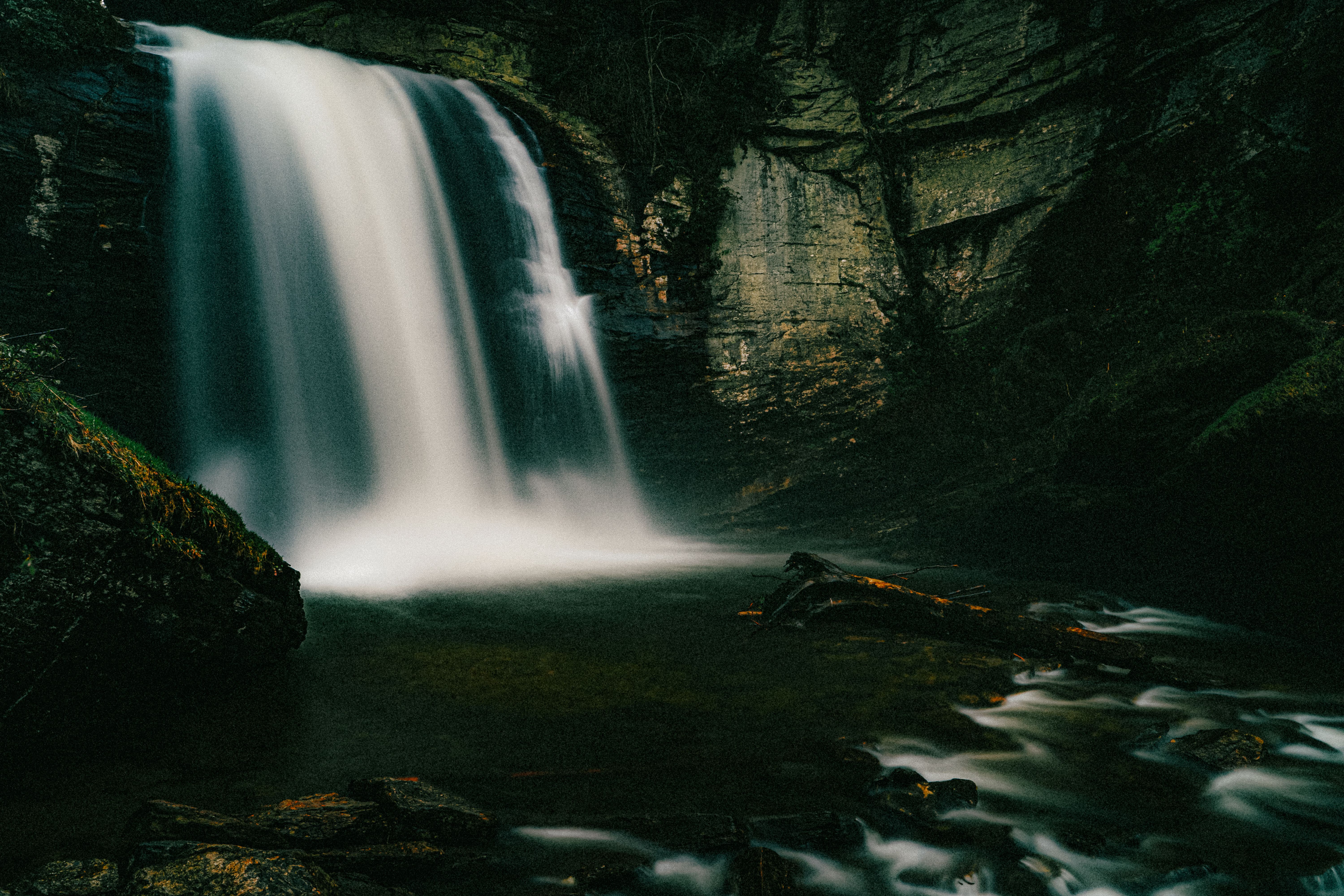 Serene Waterfall in Lush Forest Setting · Free Stock Photo