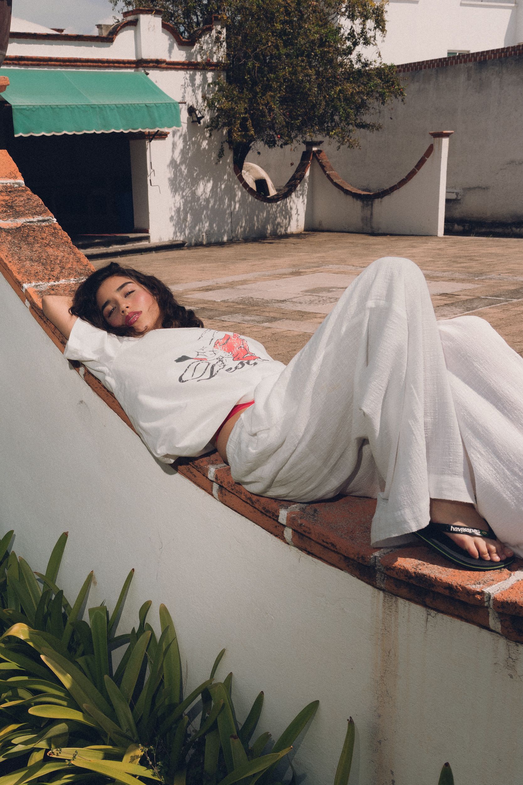 Woman Relaxing Outdoors in Warm Summer Sun · Free Stock Photo