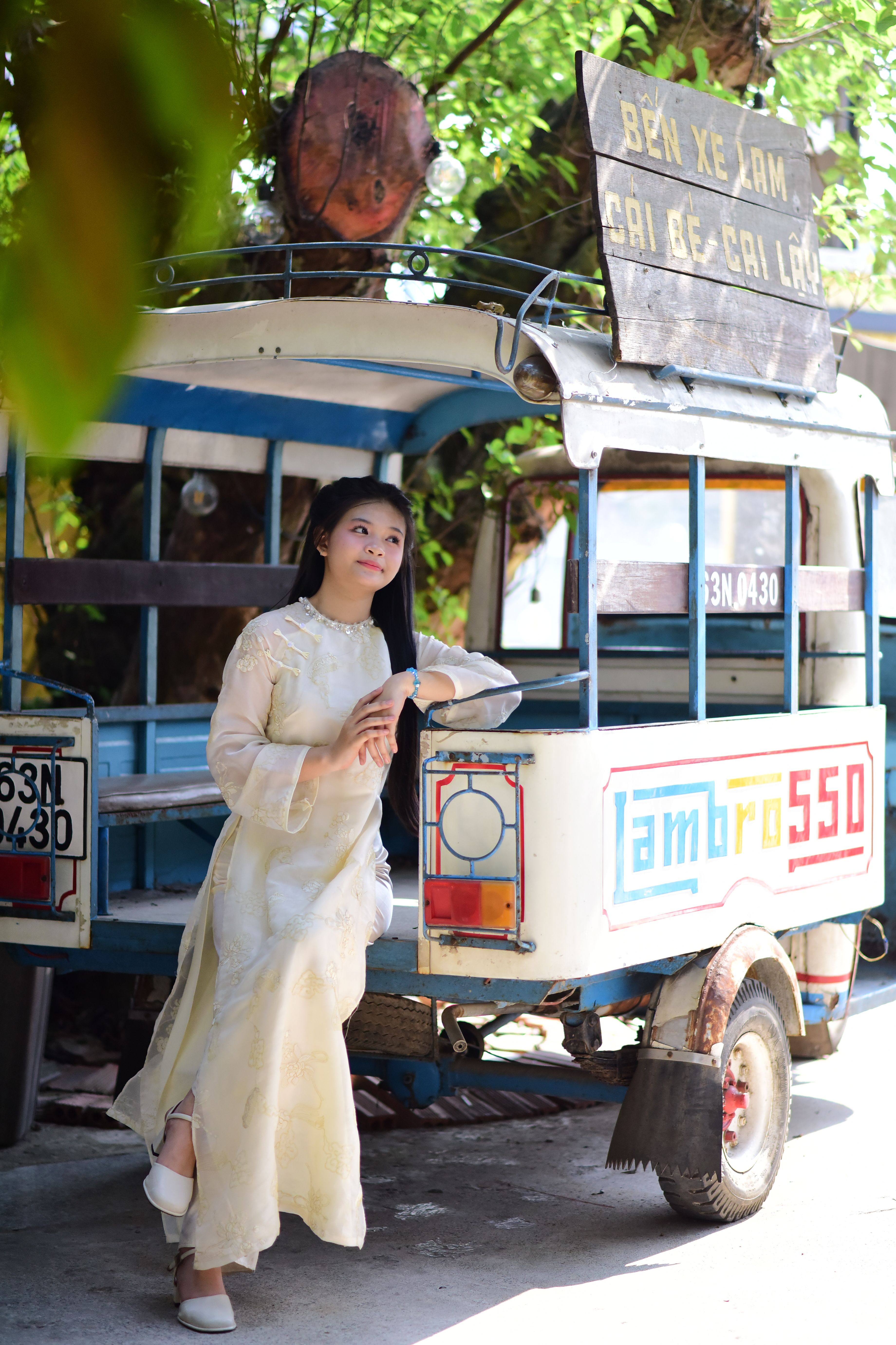 Vintage Asian Woman Posing by Retro Vehicle · Free Stock Photo