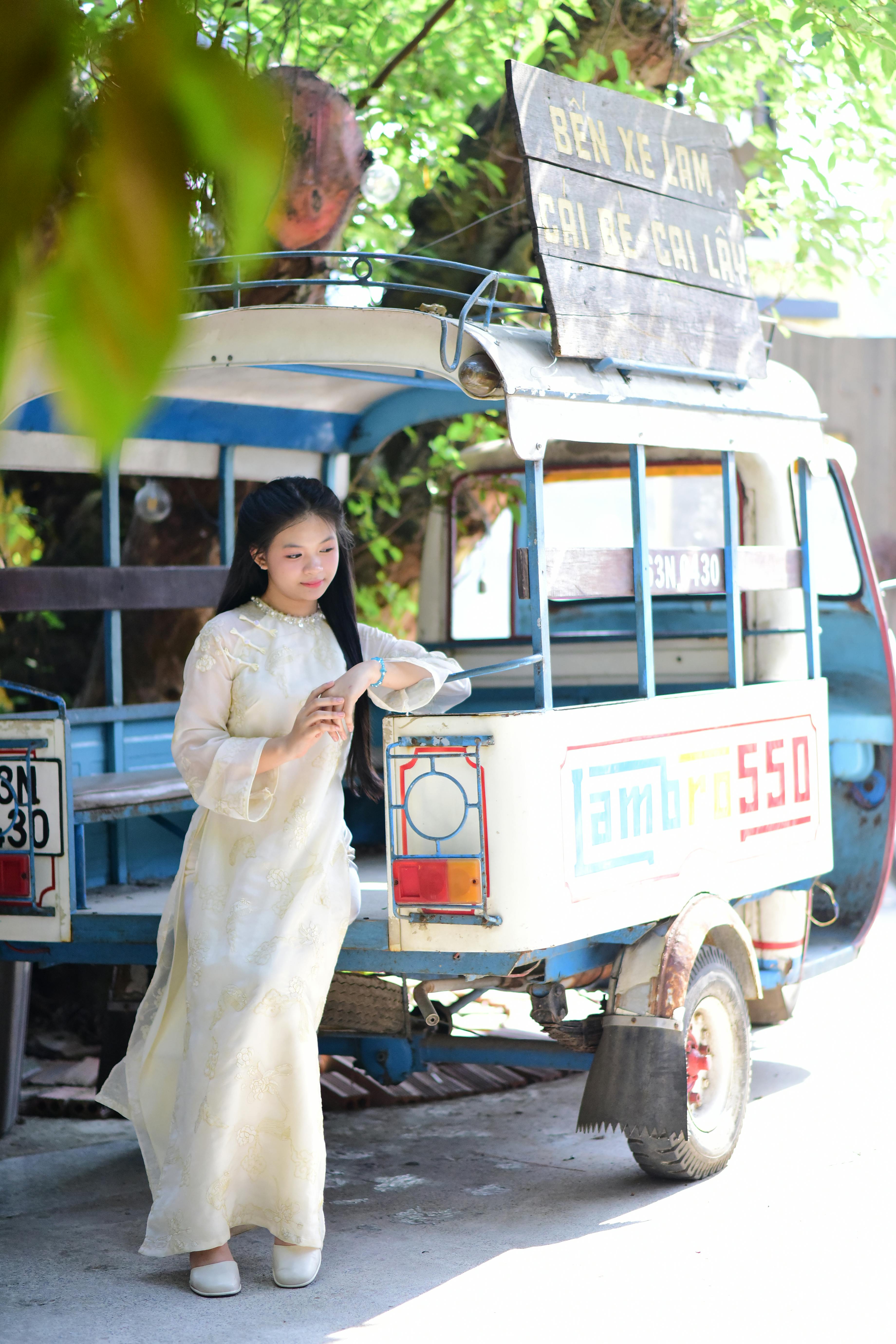 Woman in Traditional Dress by Vintage Tuk-Tuk · Free Stock Photo