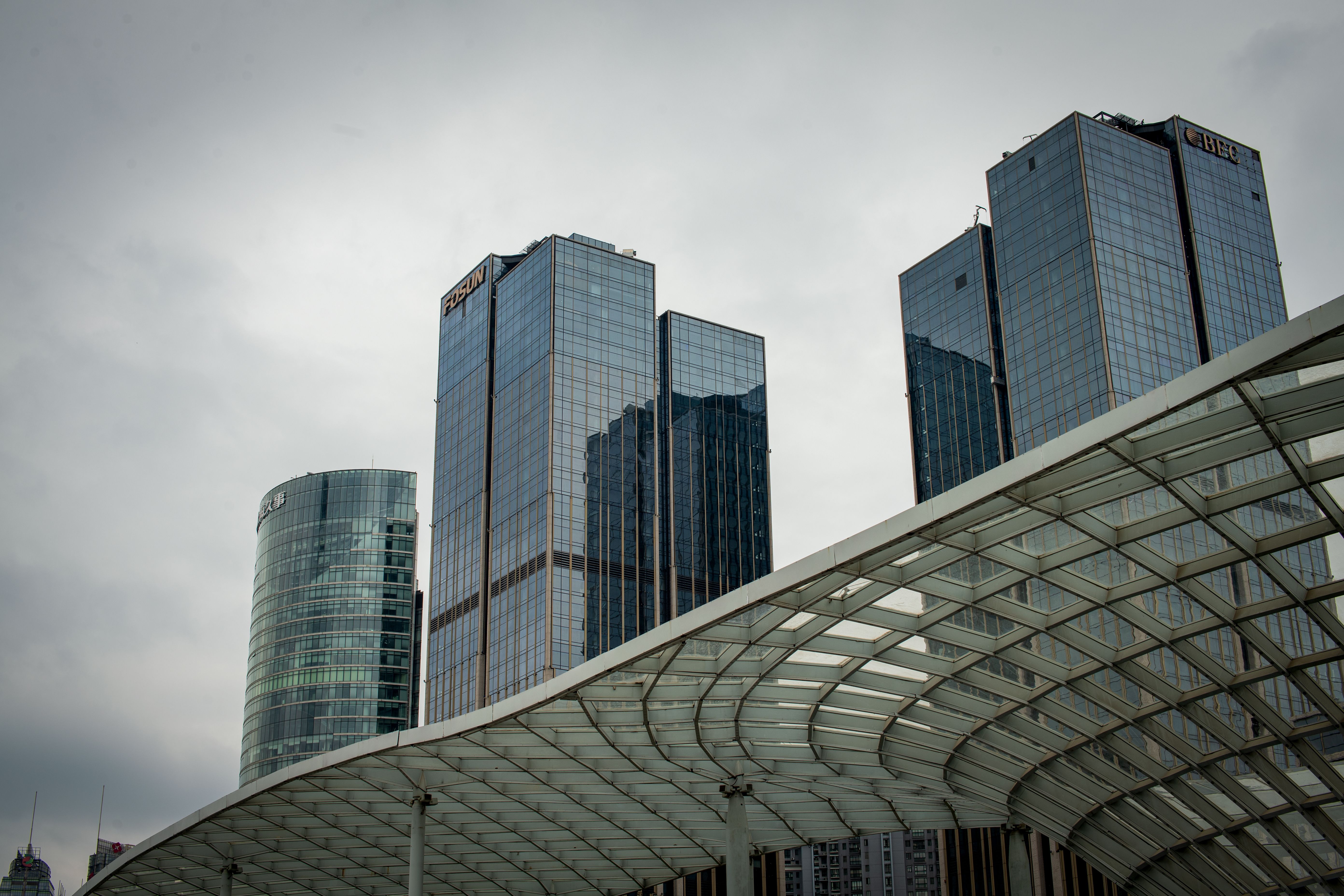 Shanghai Skyscrapers with Modern Roof Structure · Free Stock Photo