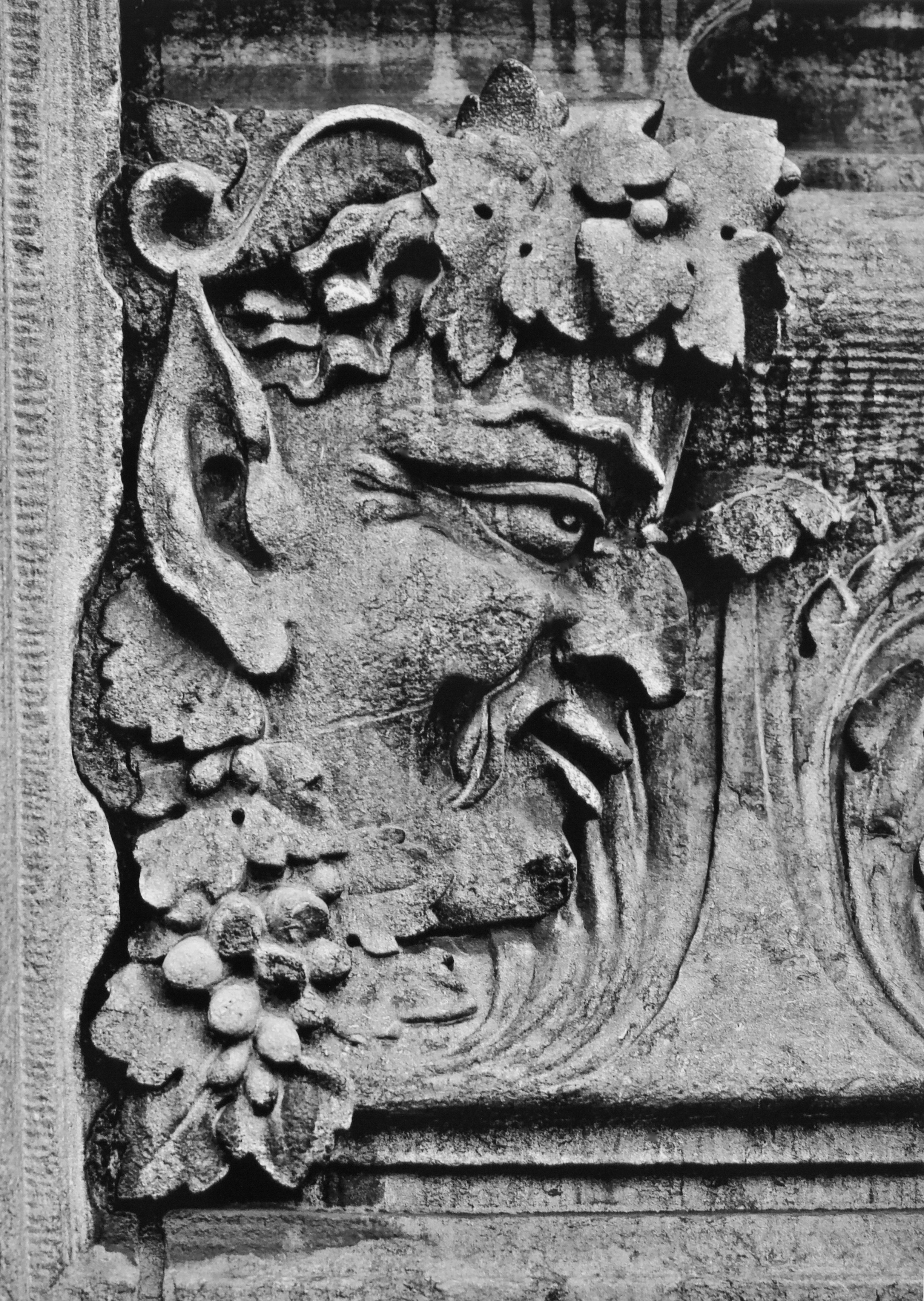 Intricate Stone Carving of Mythical Creature · Free Stock Photo