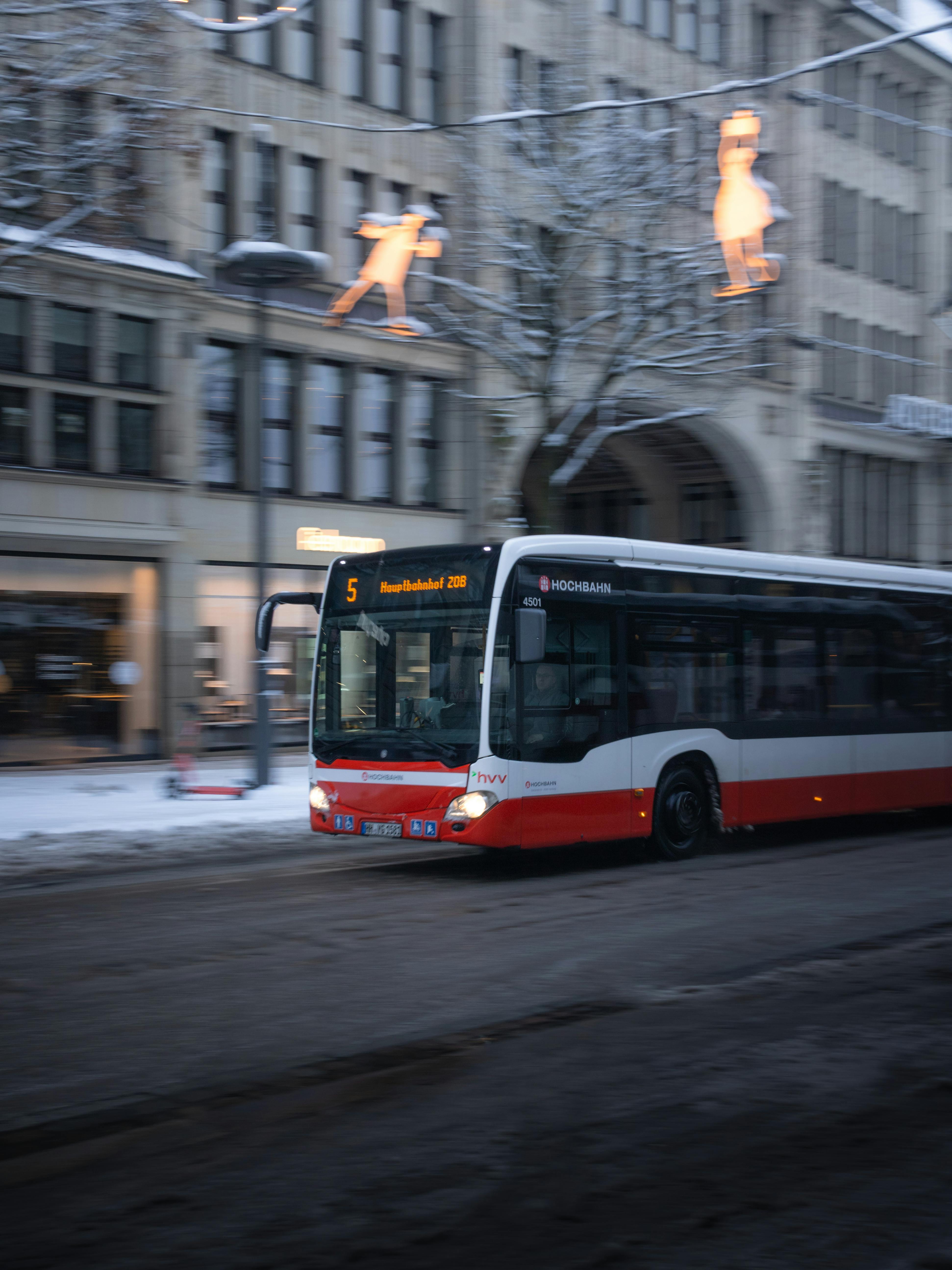 Winter Street Scene with Moving Bus in Hamburg · Free Stock Photo
