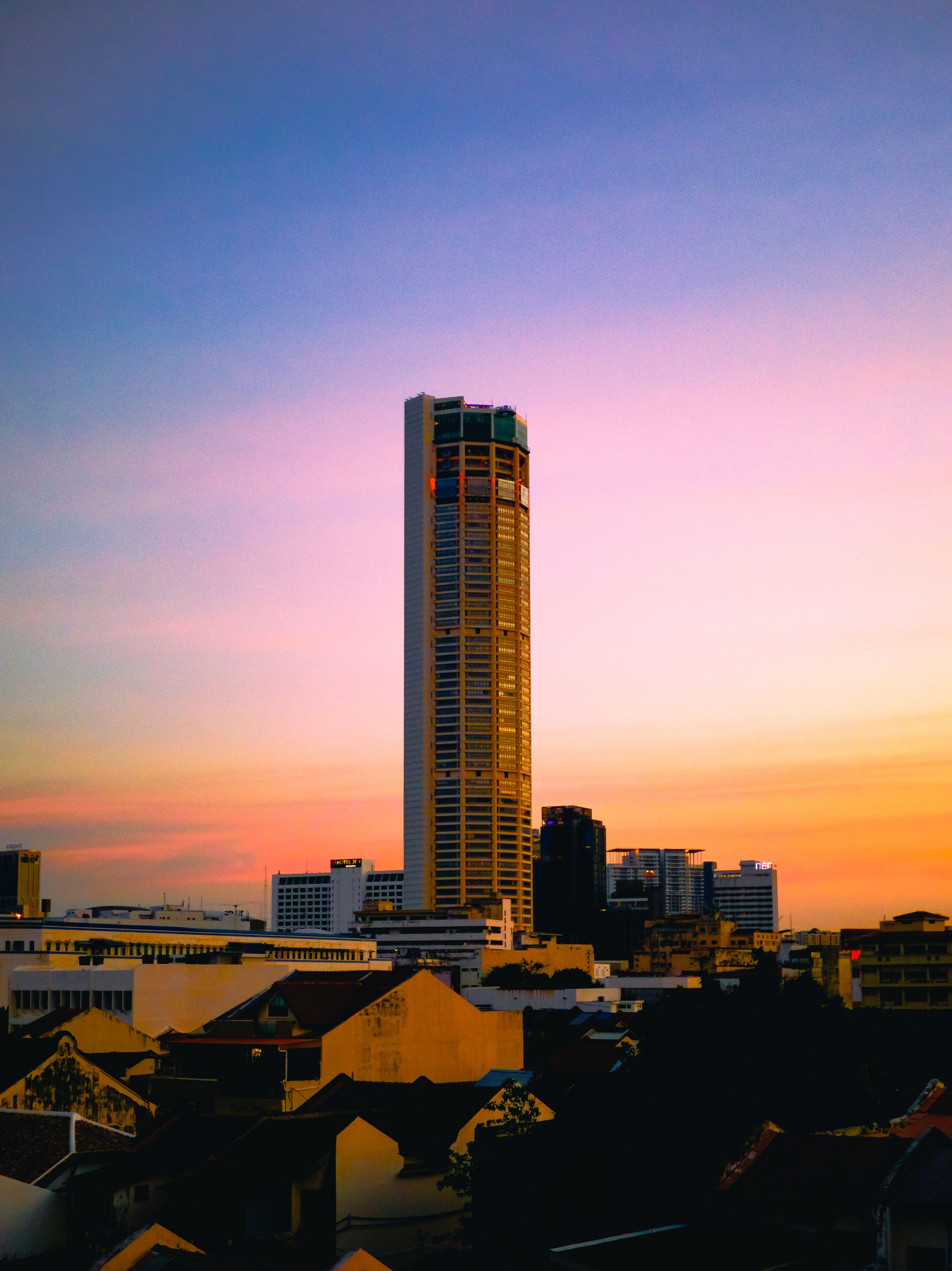 Komtar Tower at Sunset in George Town, Malaysia · Free Stock Photo