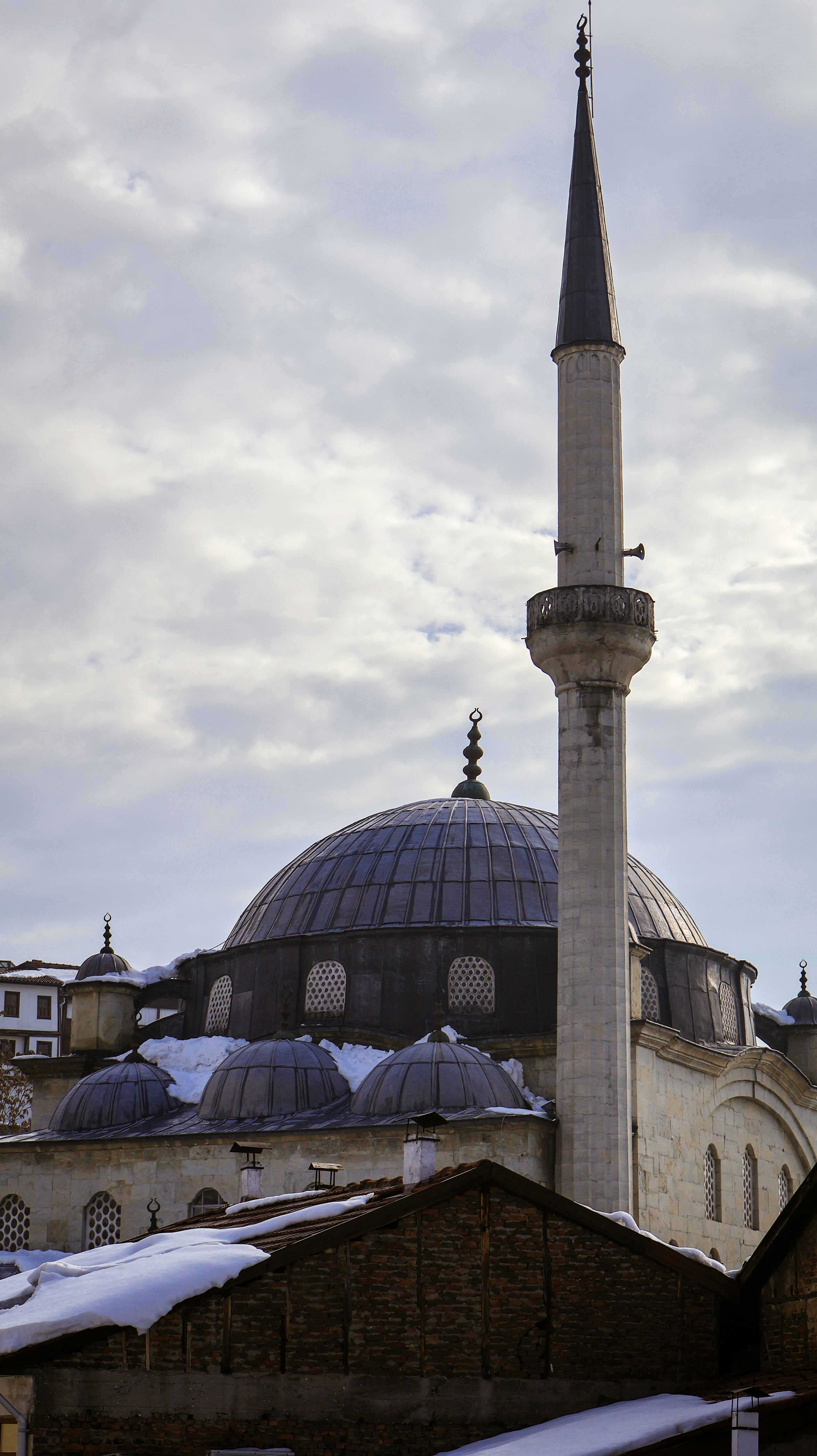 Snow-Covered Mosque with Minaret in Winter · Free Stock Photo