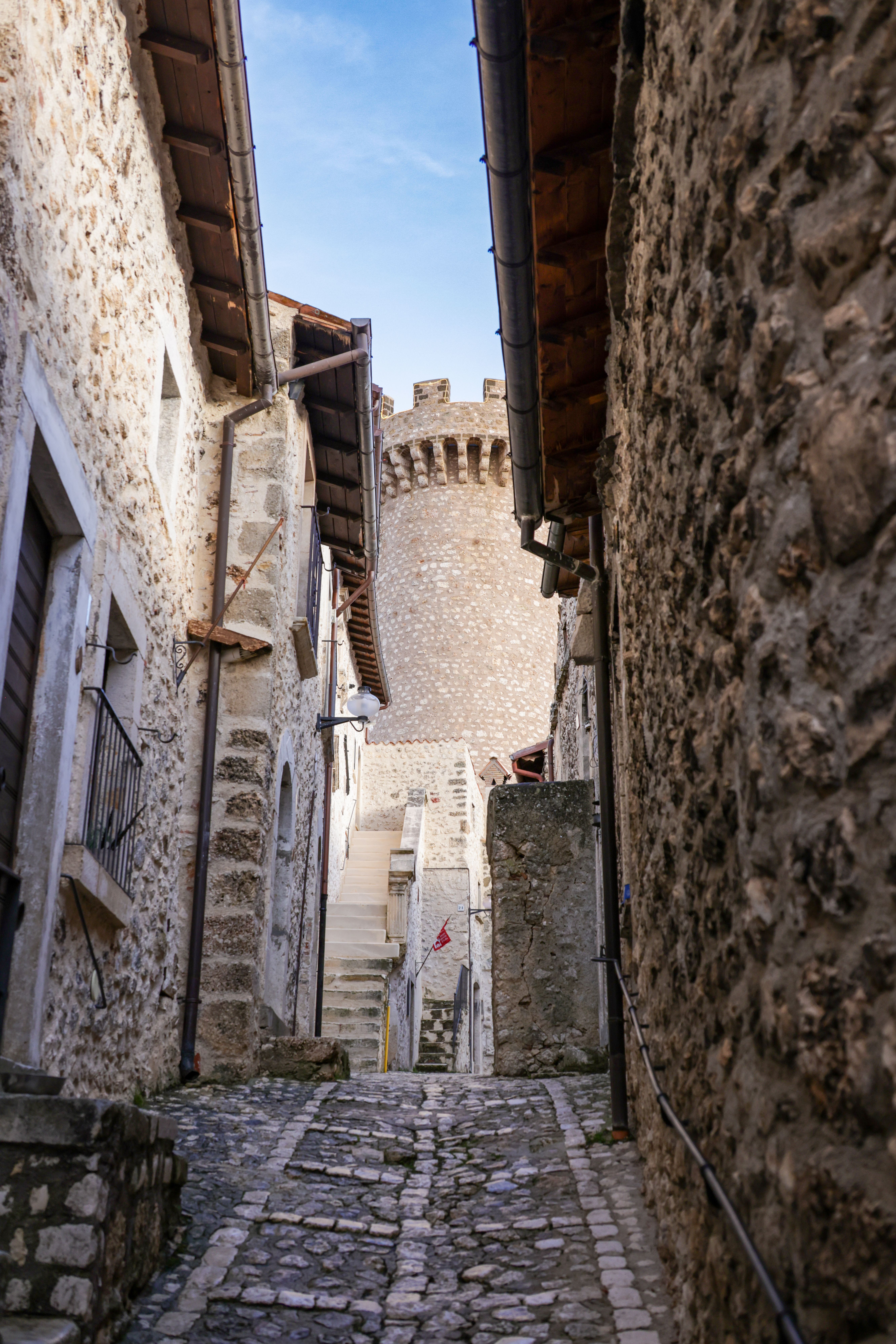 Charming Italian Village Pathway with Tower · Free Stock Photo