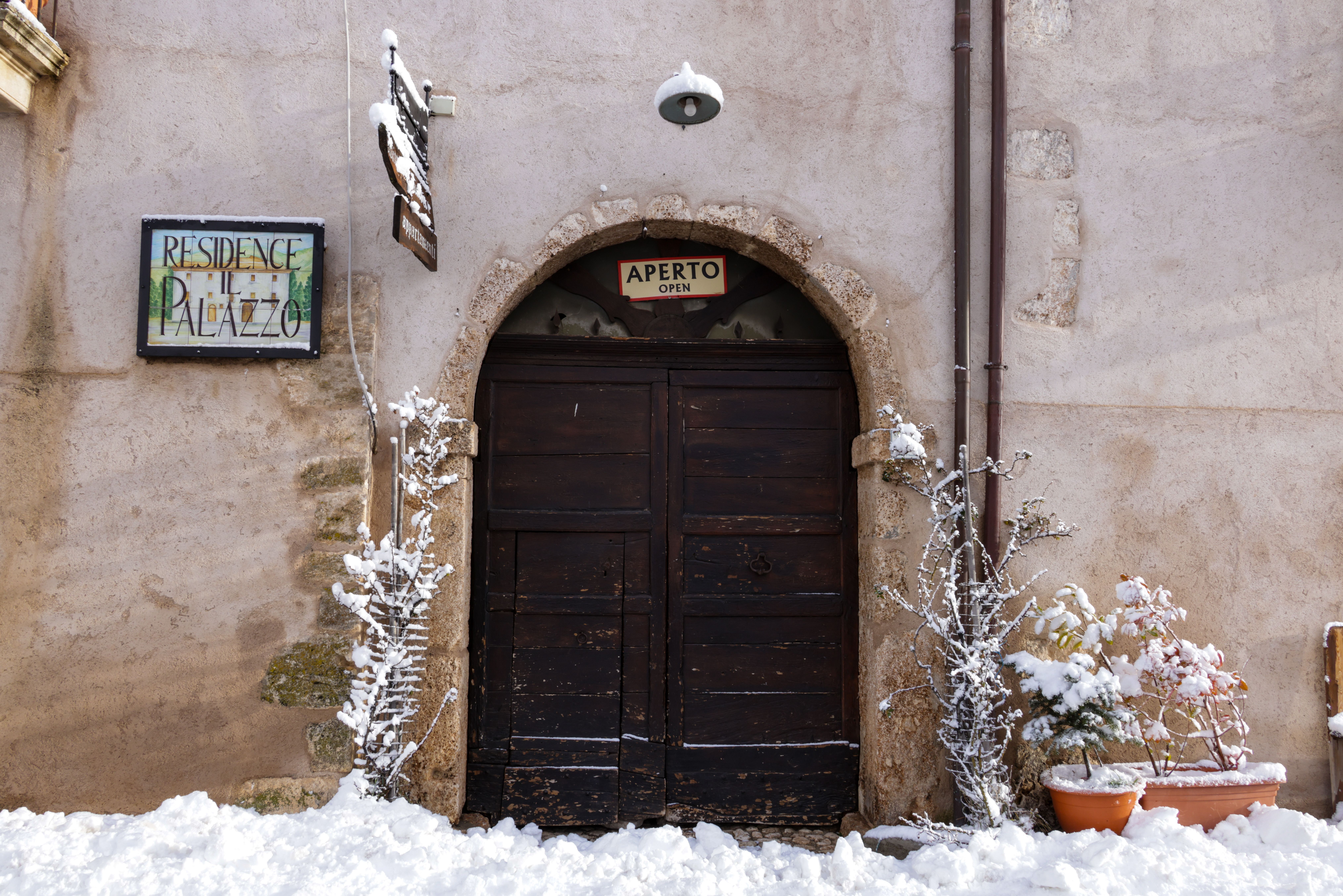 Charming Snowy Entrance in Italian Village · Free Stock Photo