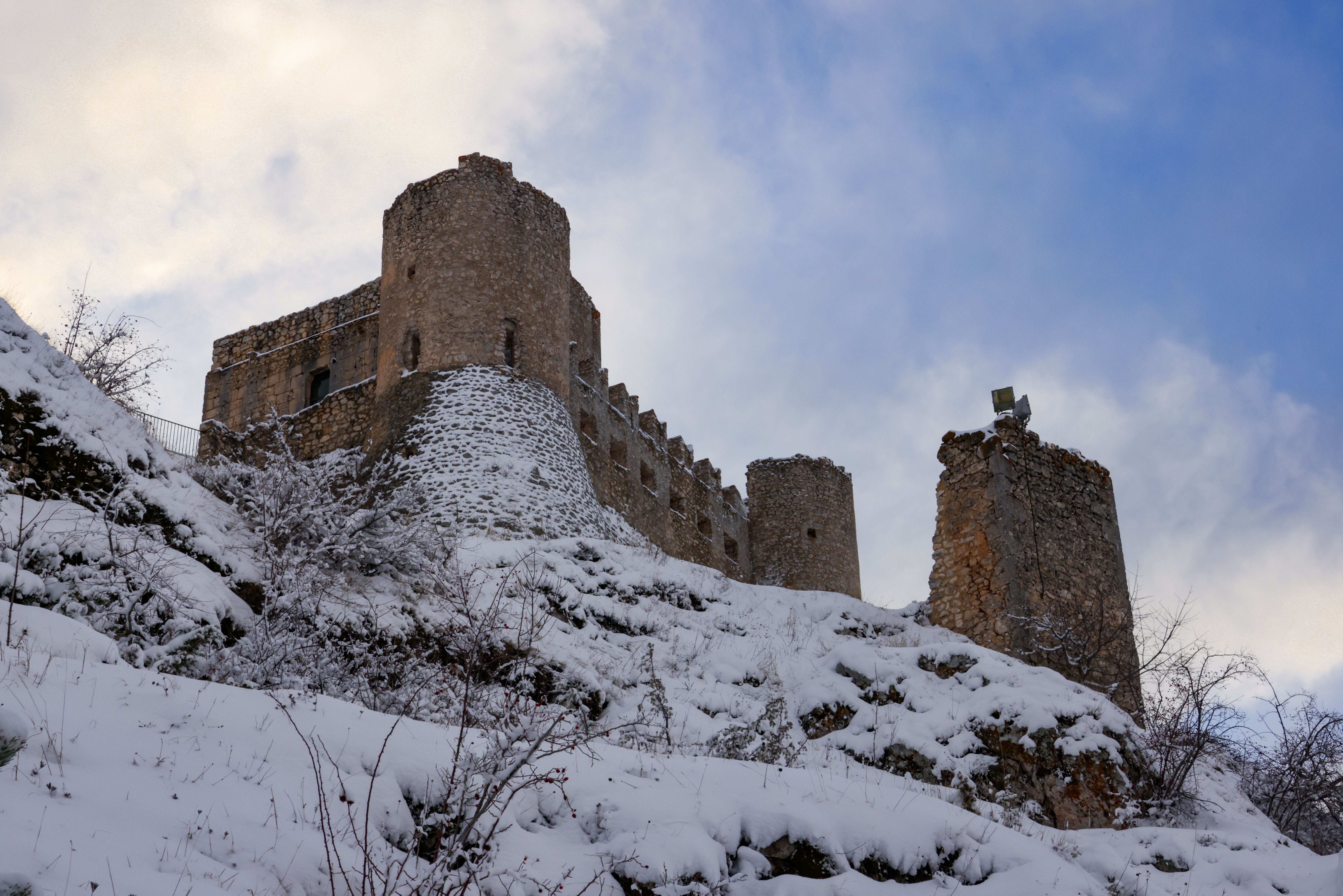 Snow-Covered Castle Ruins in Winter Landscape · Free Stock Photo