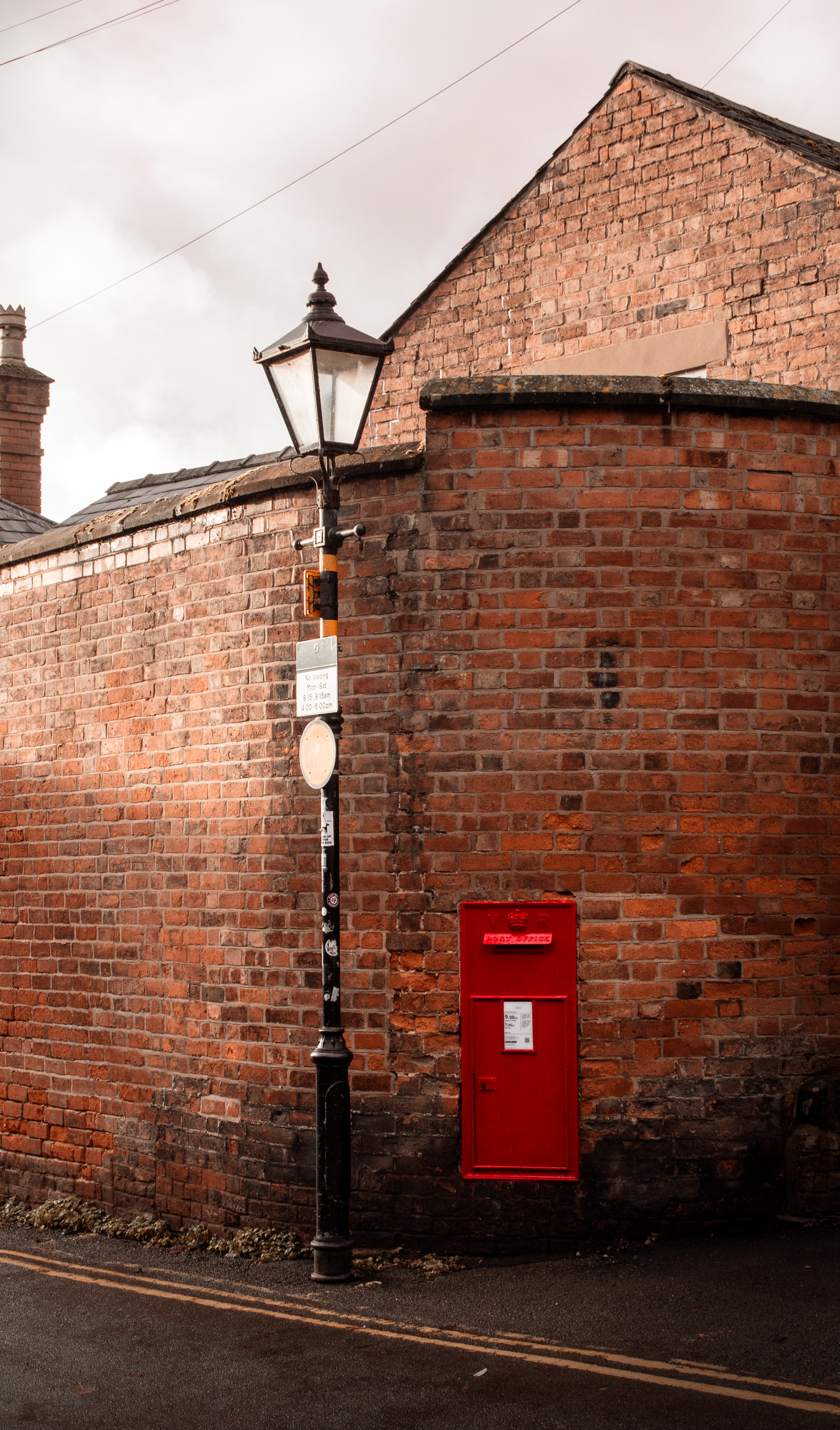 Historic Brick Wall and Red Post Box in Shrewsbury · Free Stock Photo