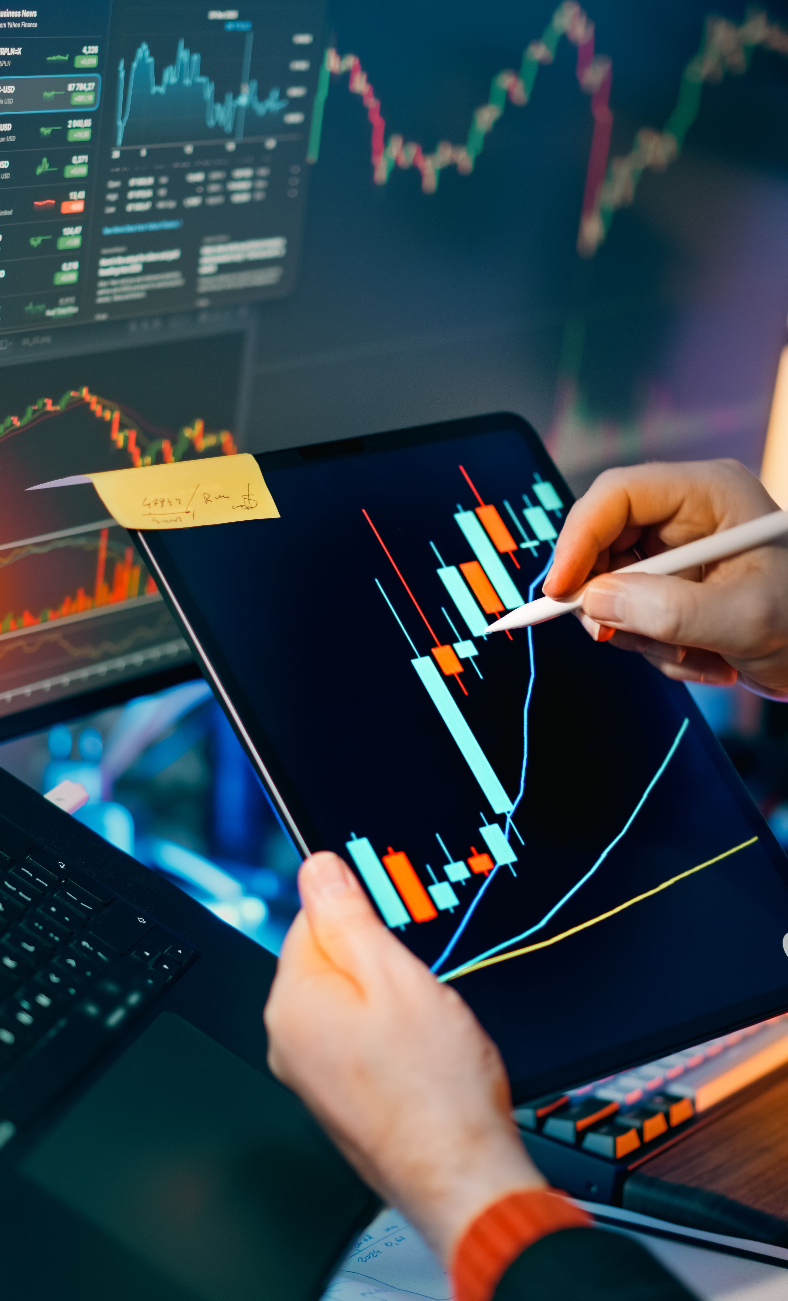 Analyzing Financial Charts on Tablet for Market Insights · Free Stock Photo