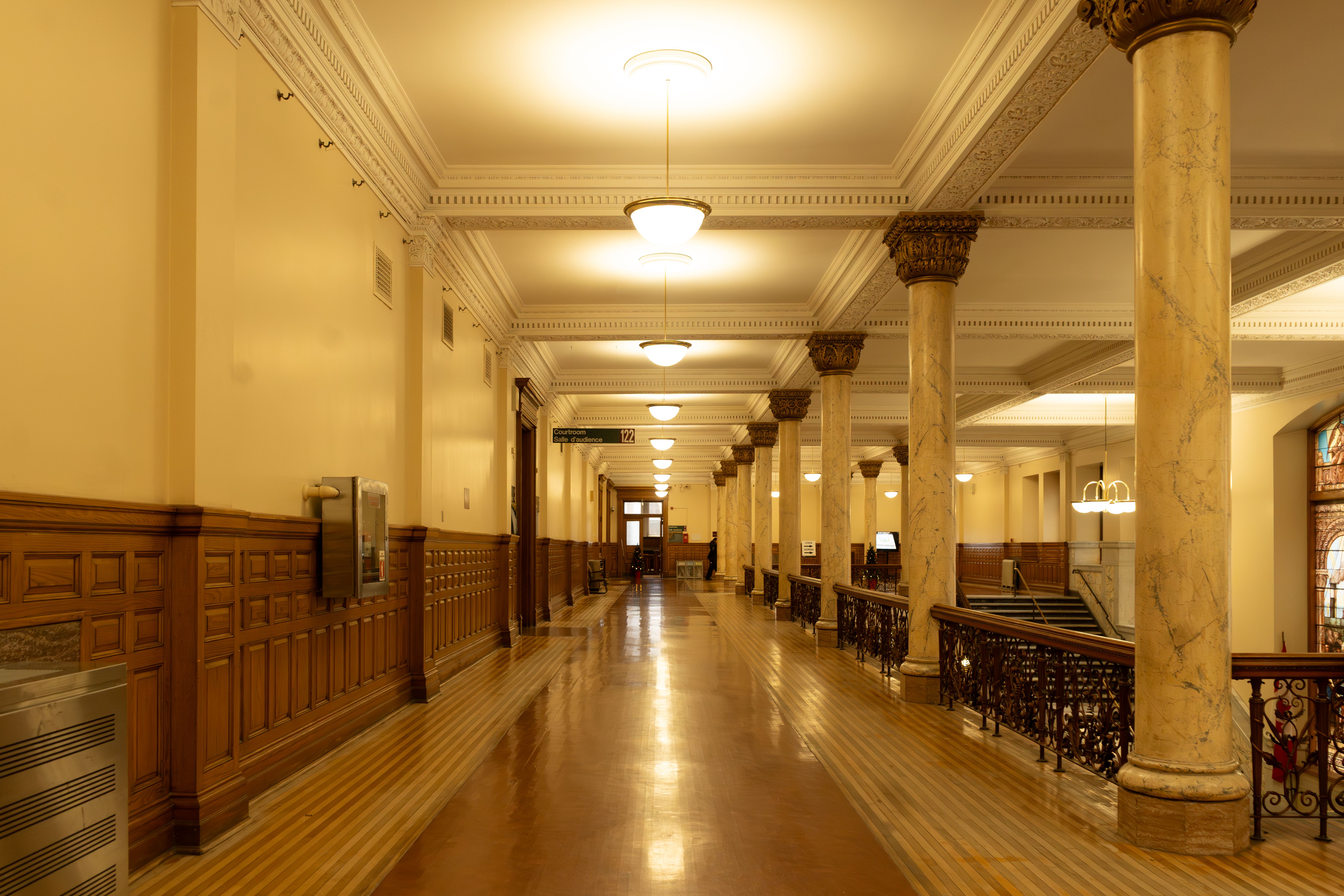 Elegant Historical Corridor with Marble Columns · Free Stock Photo