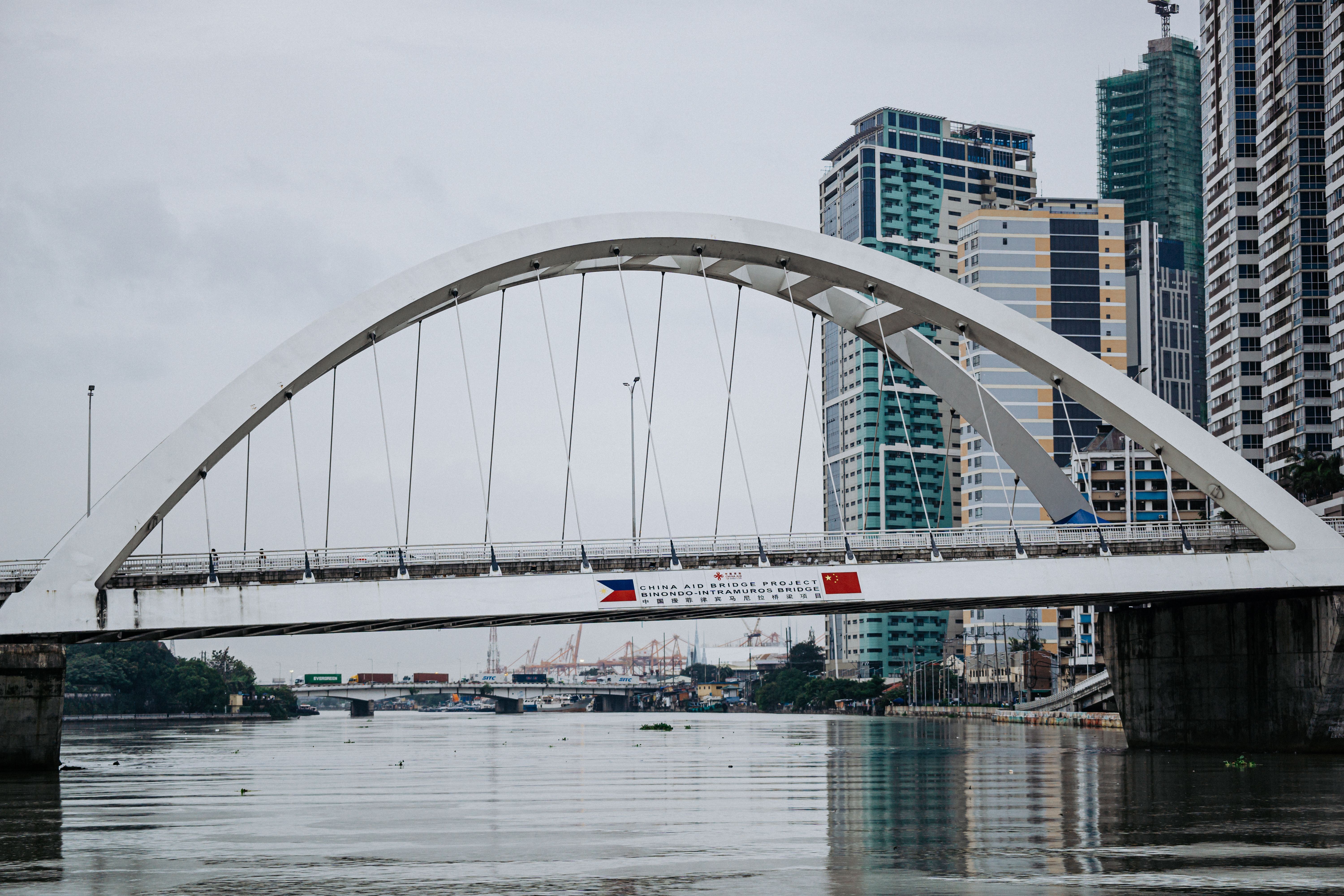 Iconic Bridge Over Pasig River in Manila · Free Stock Photo