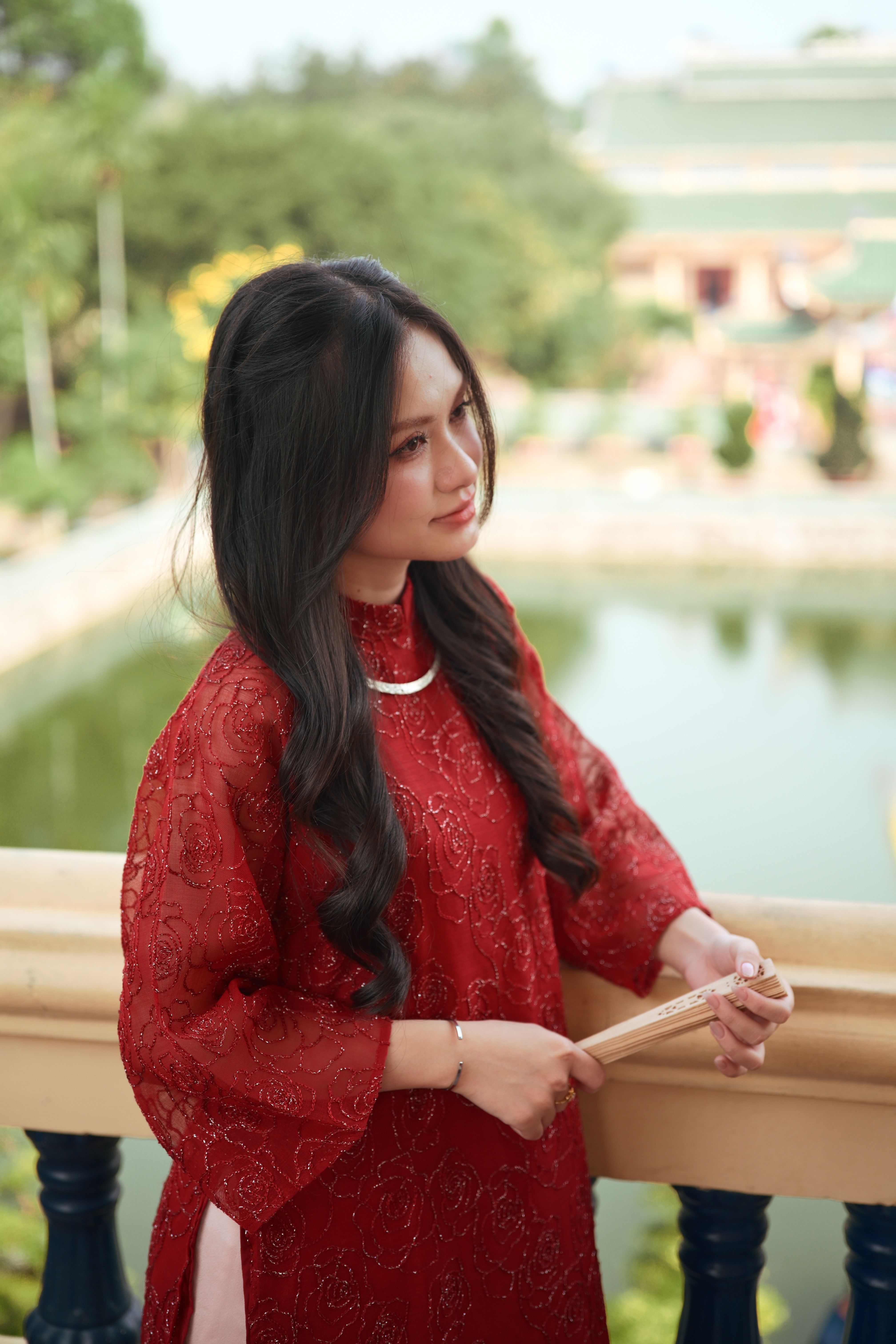 Asian Woman in Traditional Red Dress Outdoors · Free Stock Photo