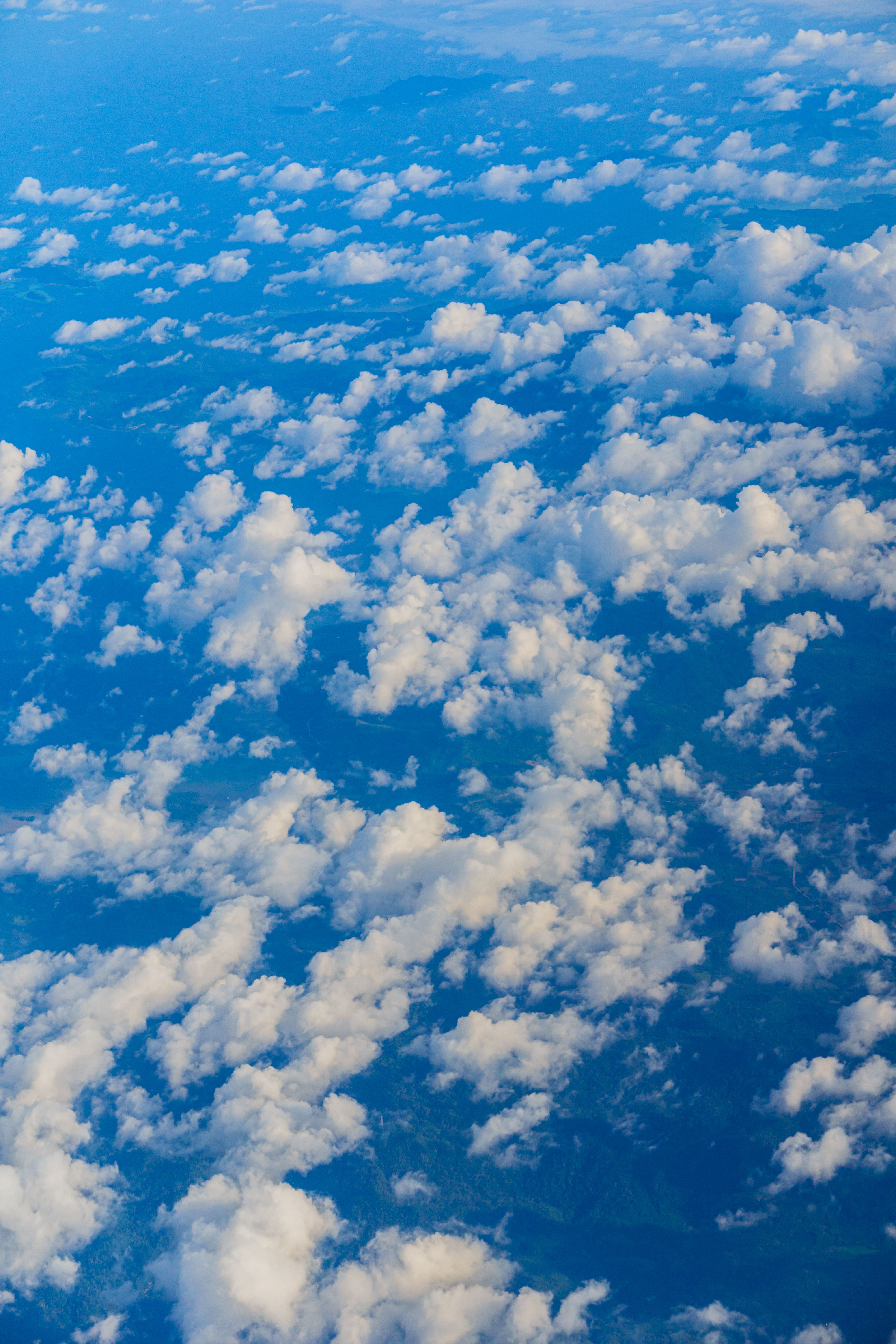 Aerial View of Clouds Over Blue Horizon · Free Stock Photo