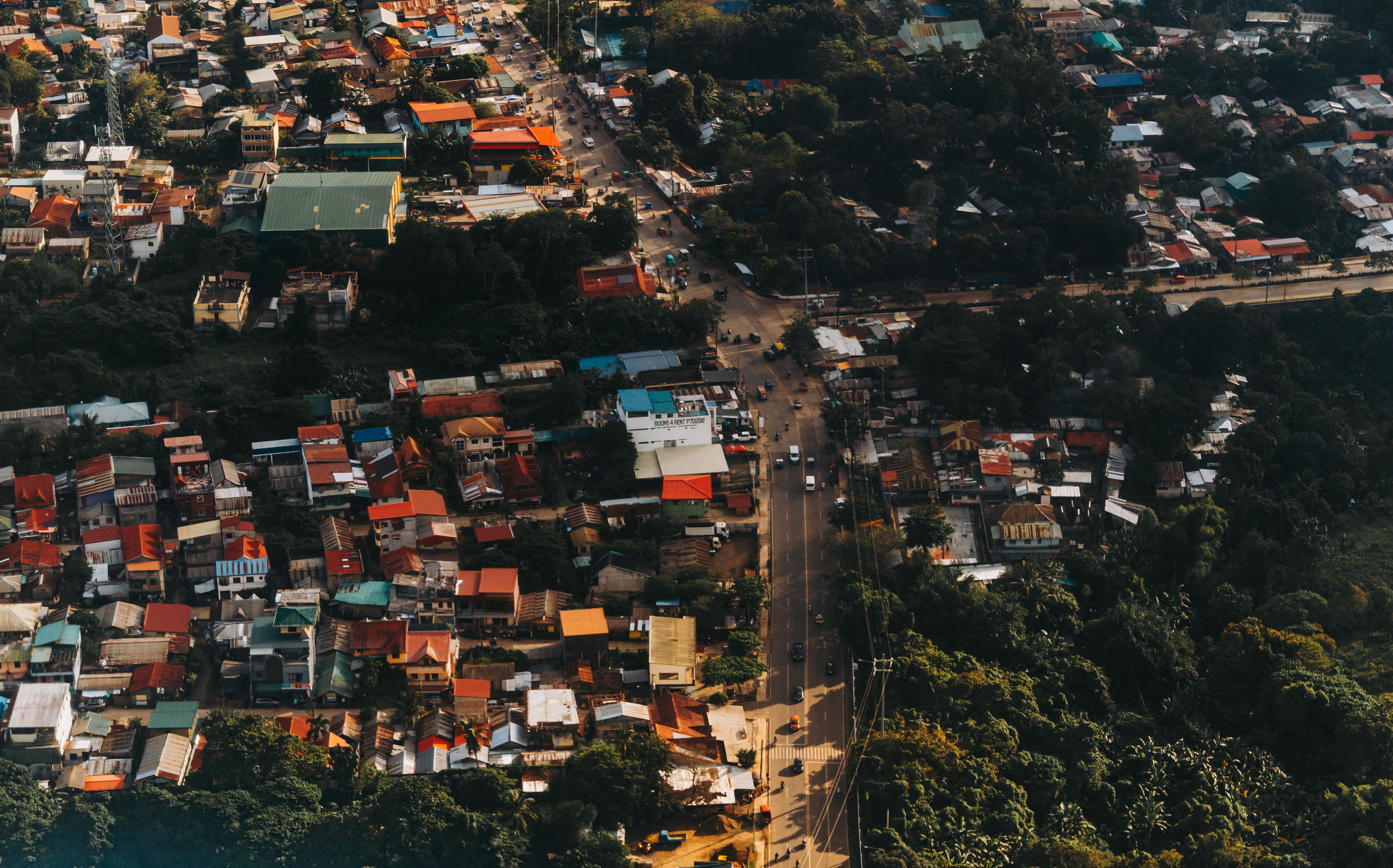 Aerial View of Urban Landscape with Roads and Buildings · Free Stock Photo
