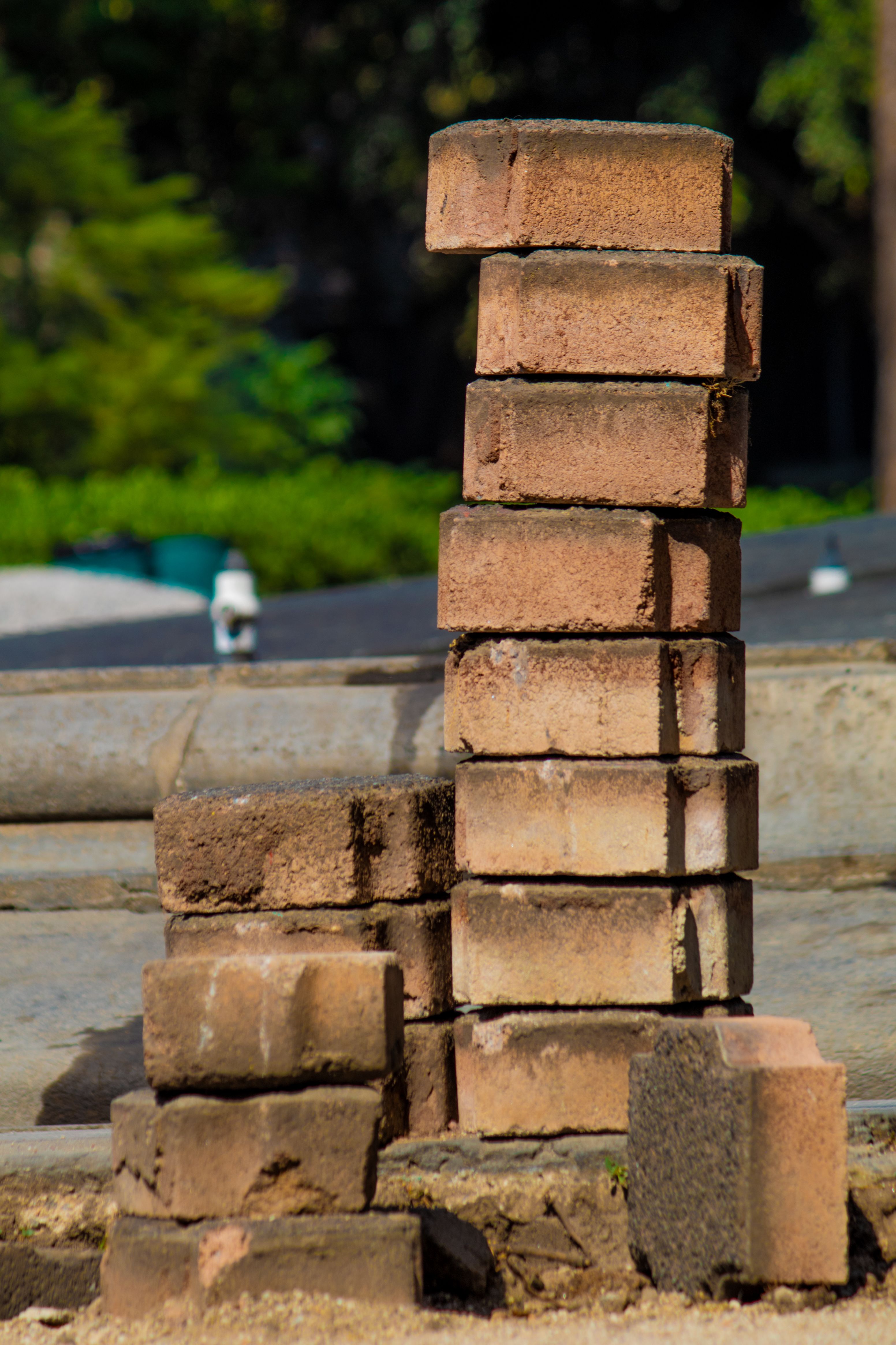 Stack of Bricks in Outdoor Urban Setting · Free Stock Photo