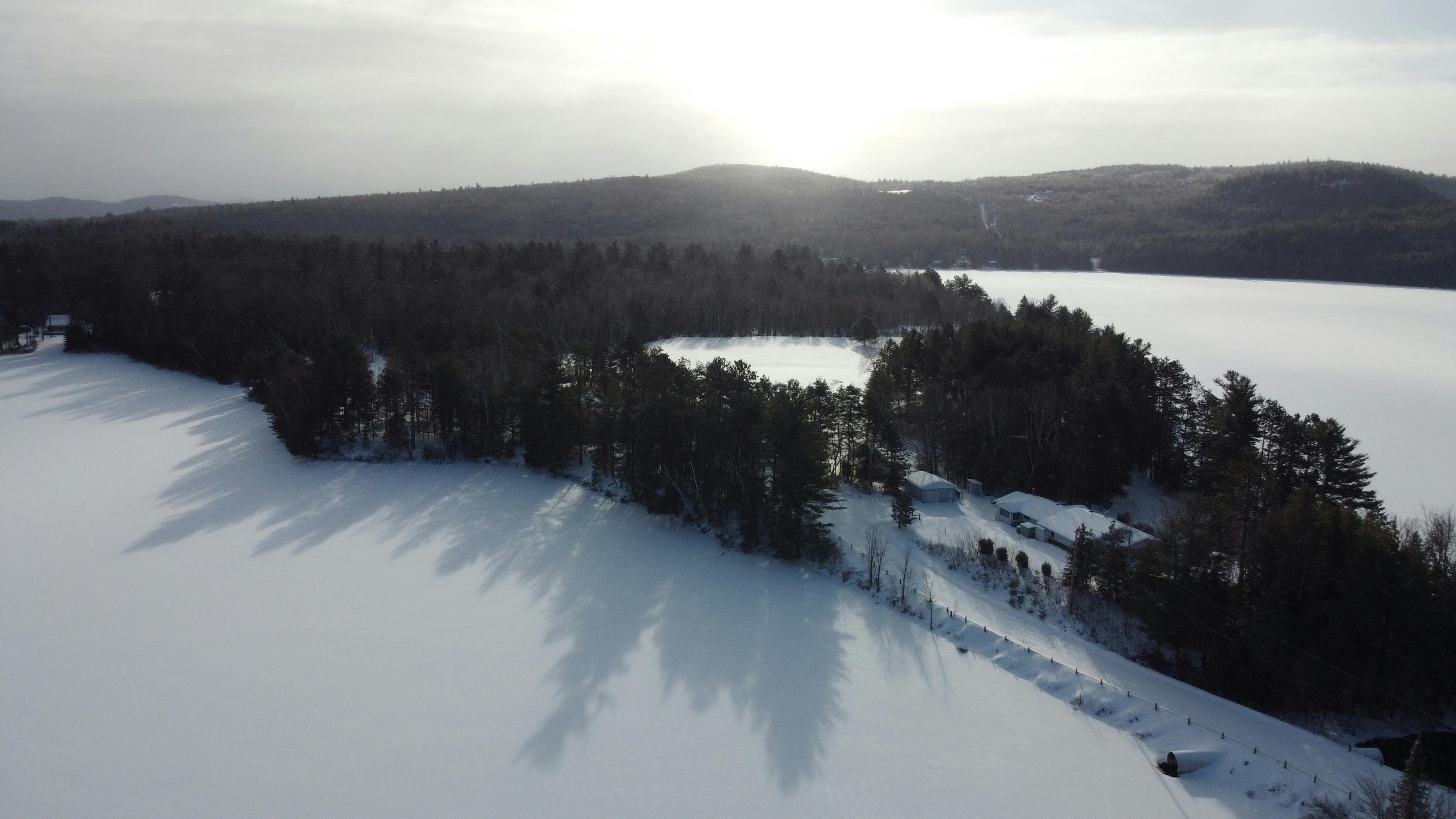 Aerial Photography of Snow-covered Field and Trees · Free Stock Photo