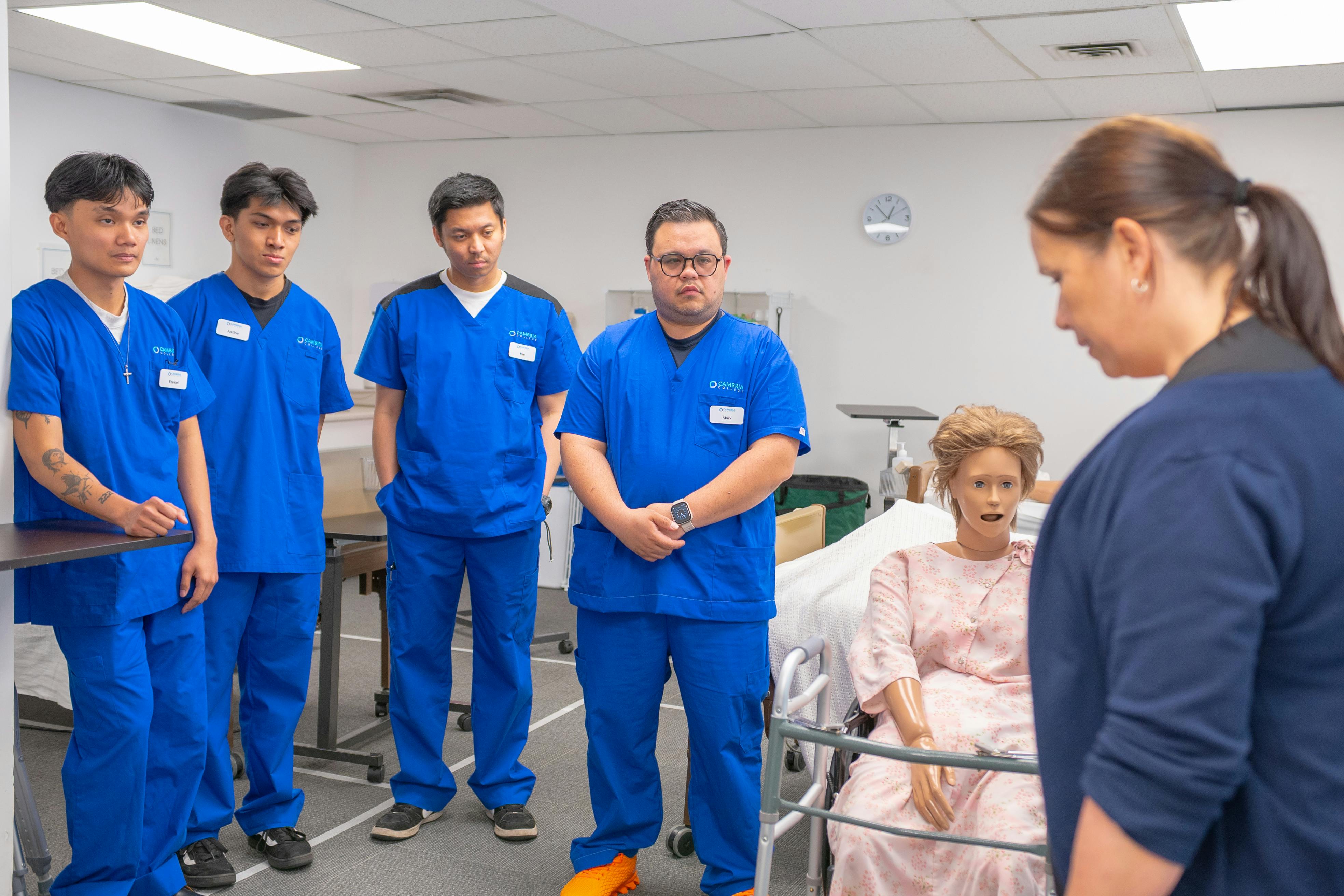 Nursing Students Practicing Patient Care · Free Stock Photo