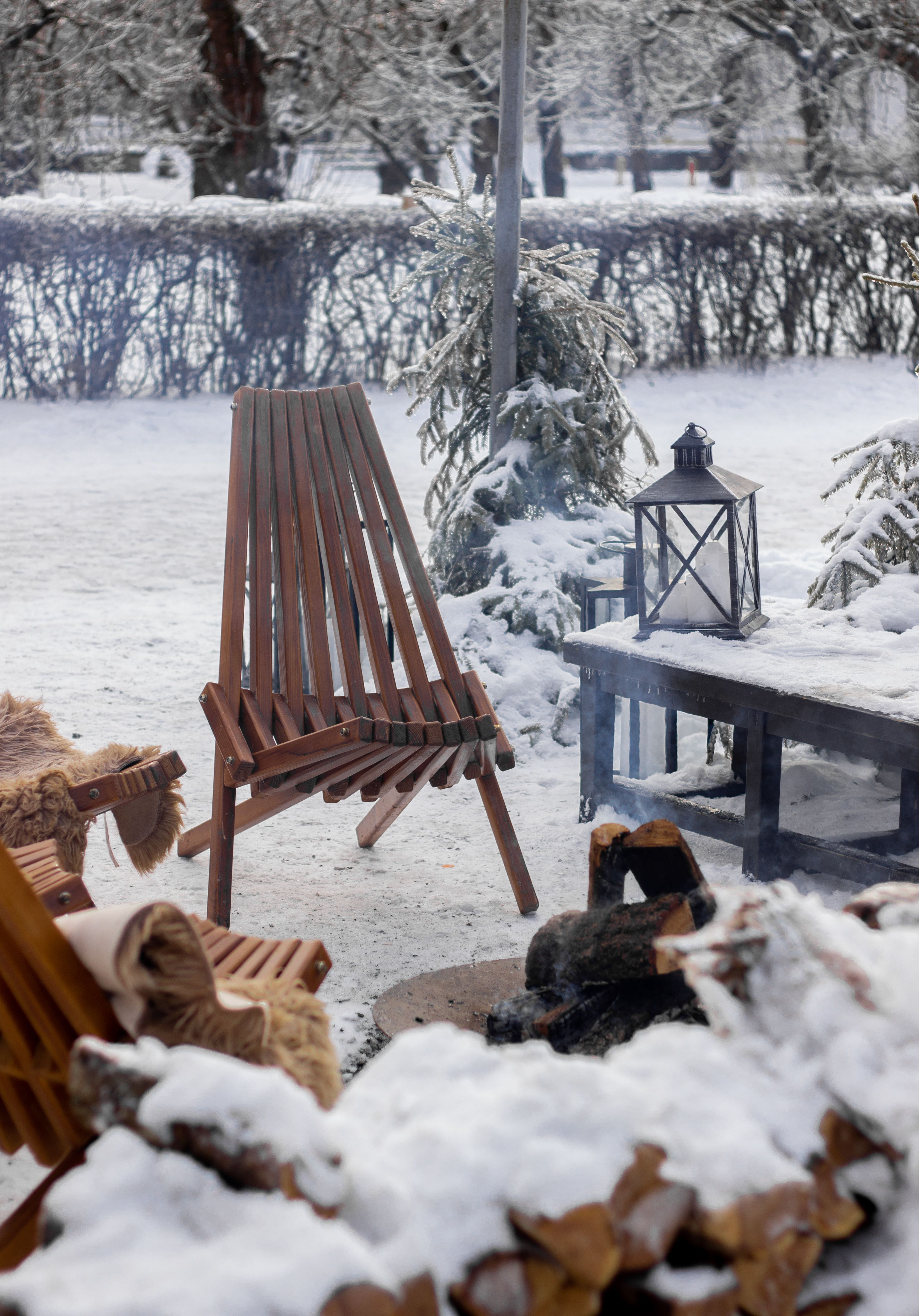 Cozy Winter Outdoor Setting with Chairs and Firepit · Free Stock Photo