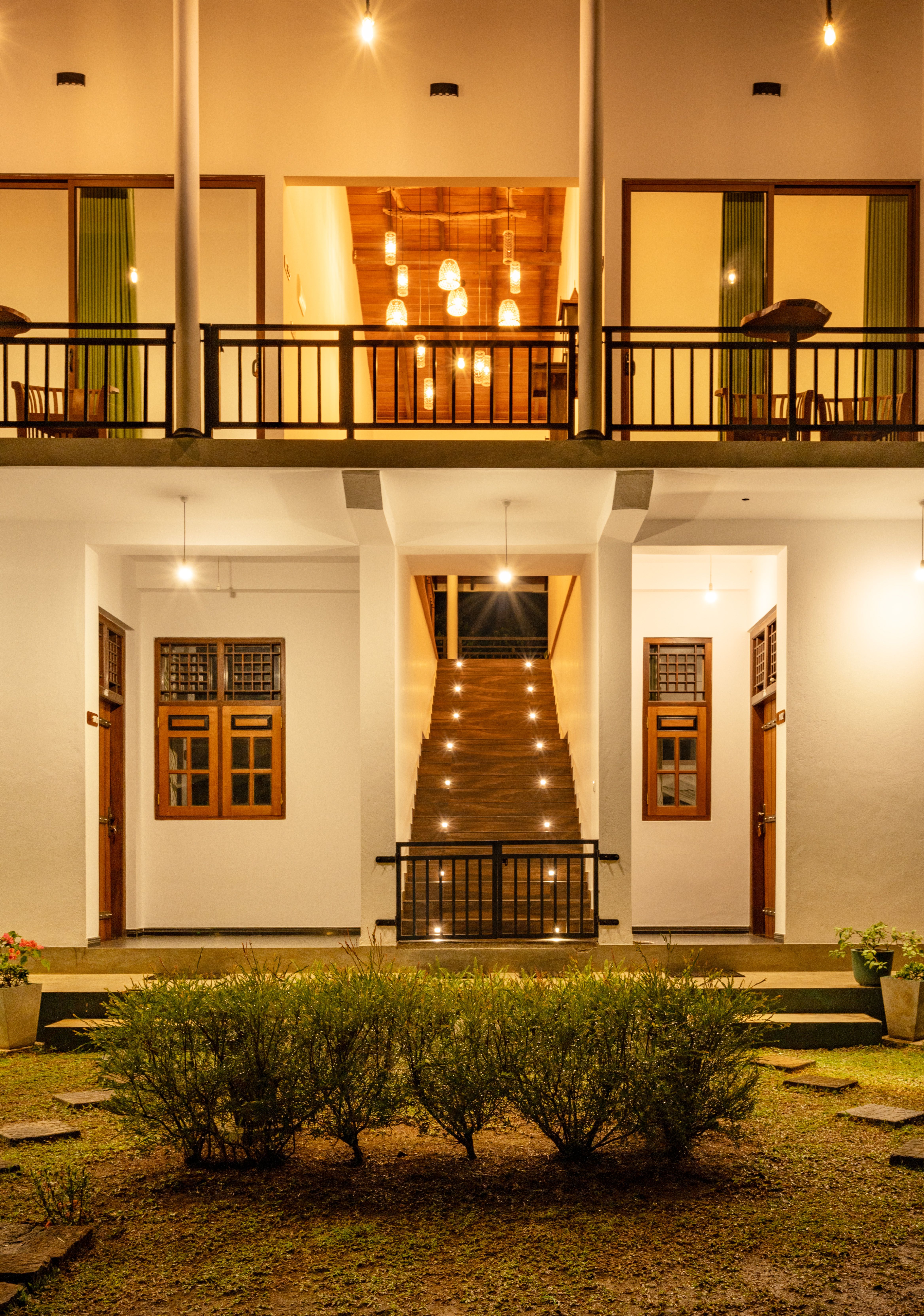 Elegant Two-Story Building with Warm Lighting · Free Stock Photo