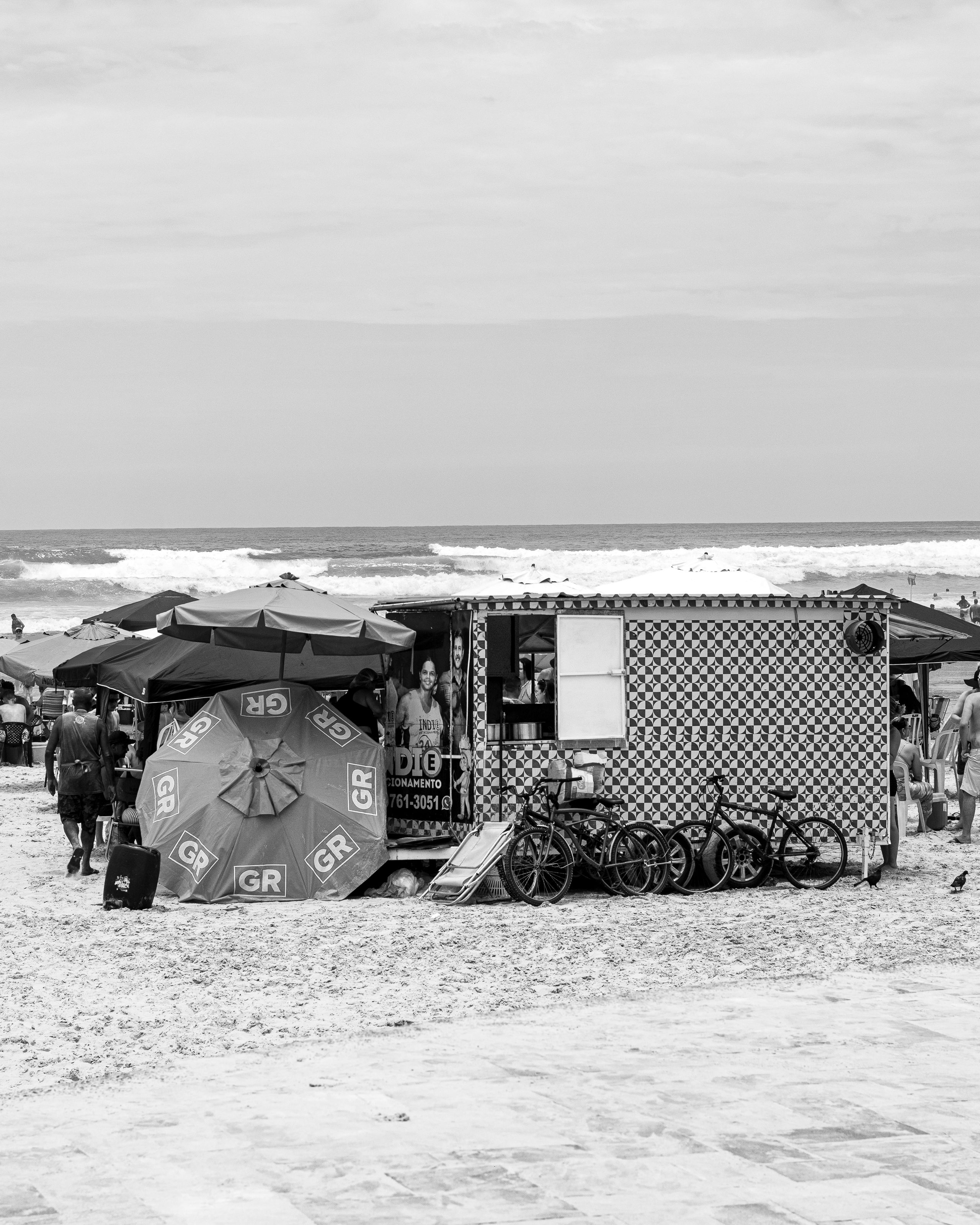 Black and White Beach Scene with Bikes · Free Stock Photo