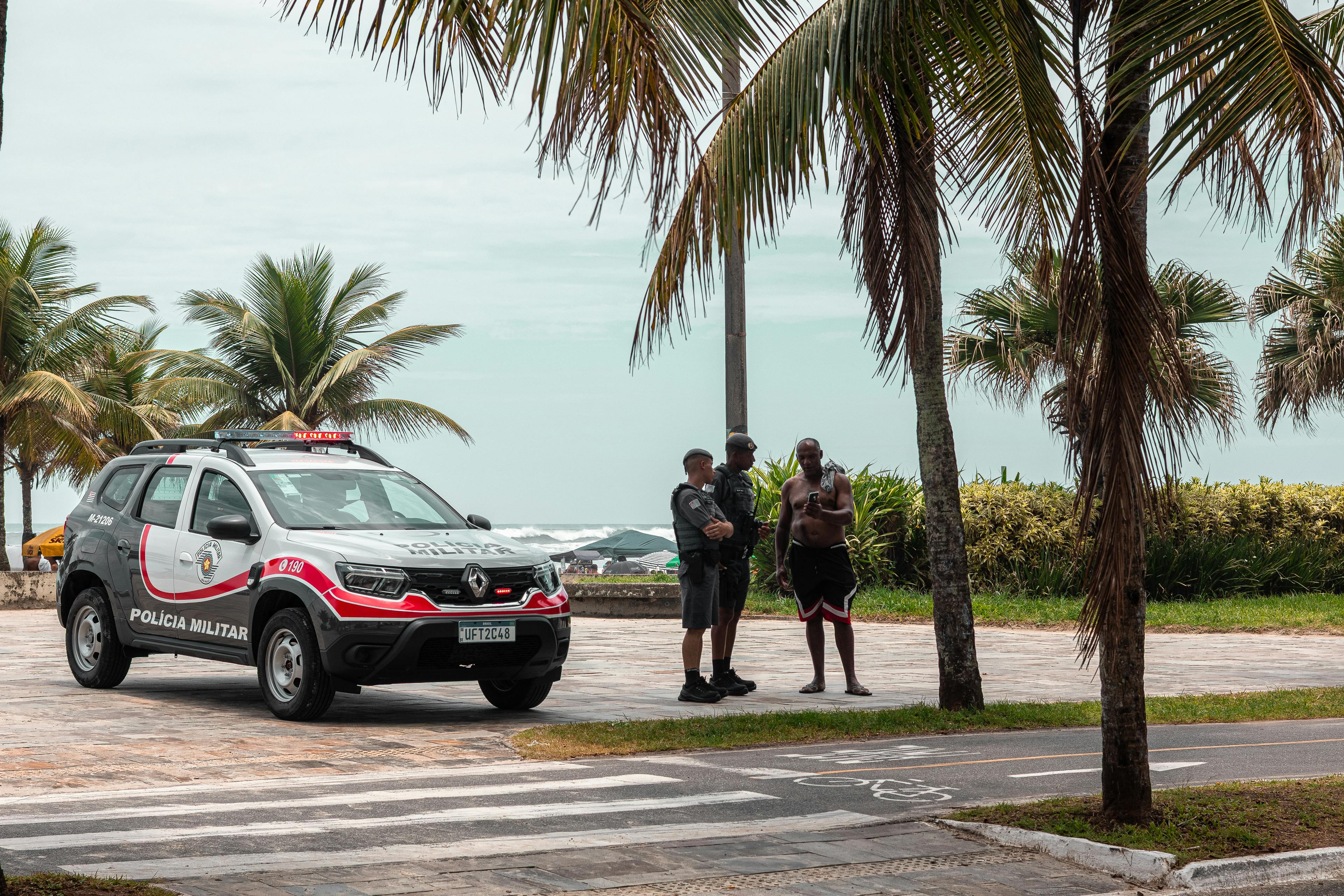 Brazilian Beachfront Police Patrol Scene · Free Stock Photo