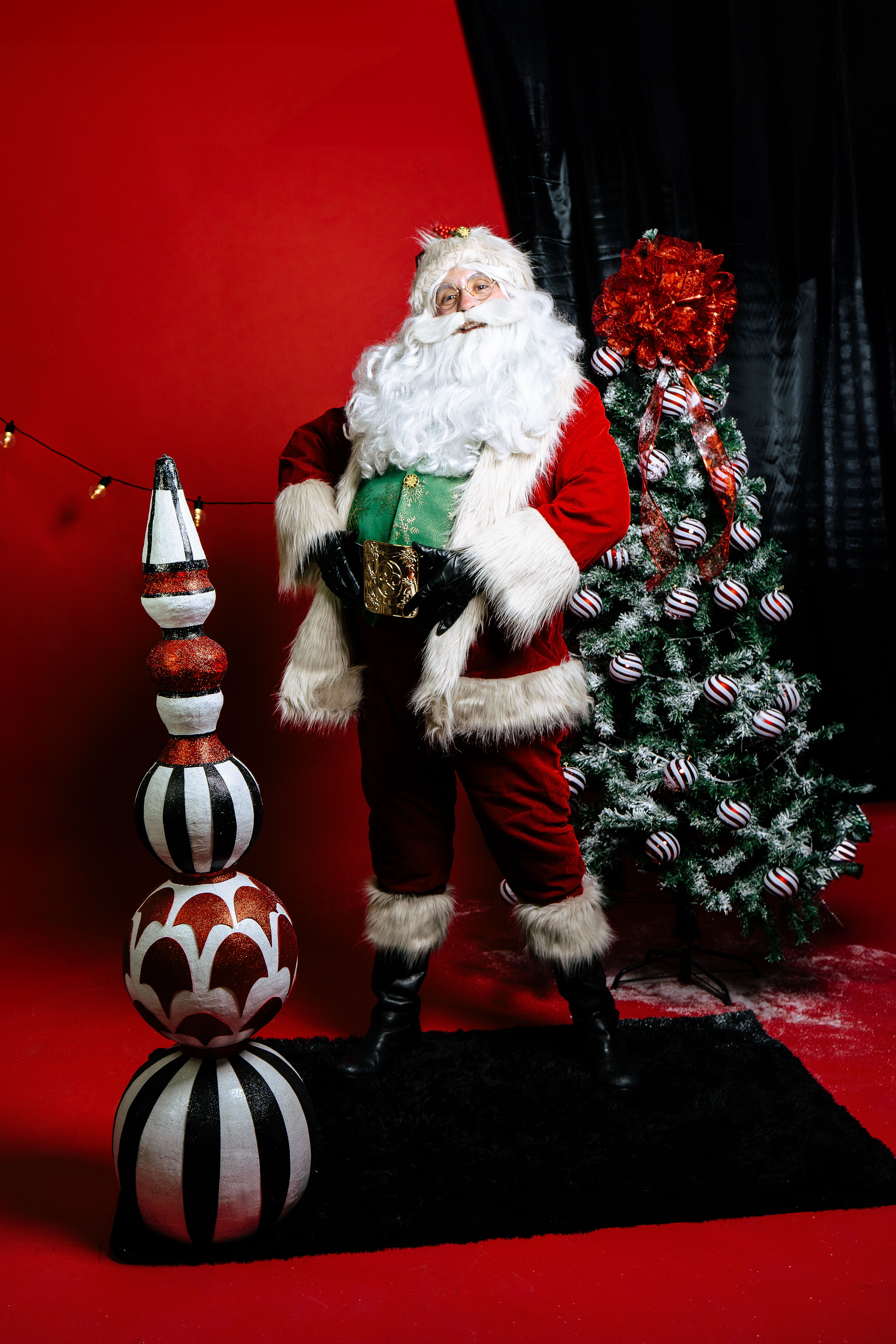 Festive Santa Claus with Christmas Decorations · Free Stock Photo