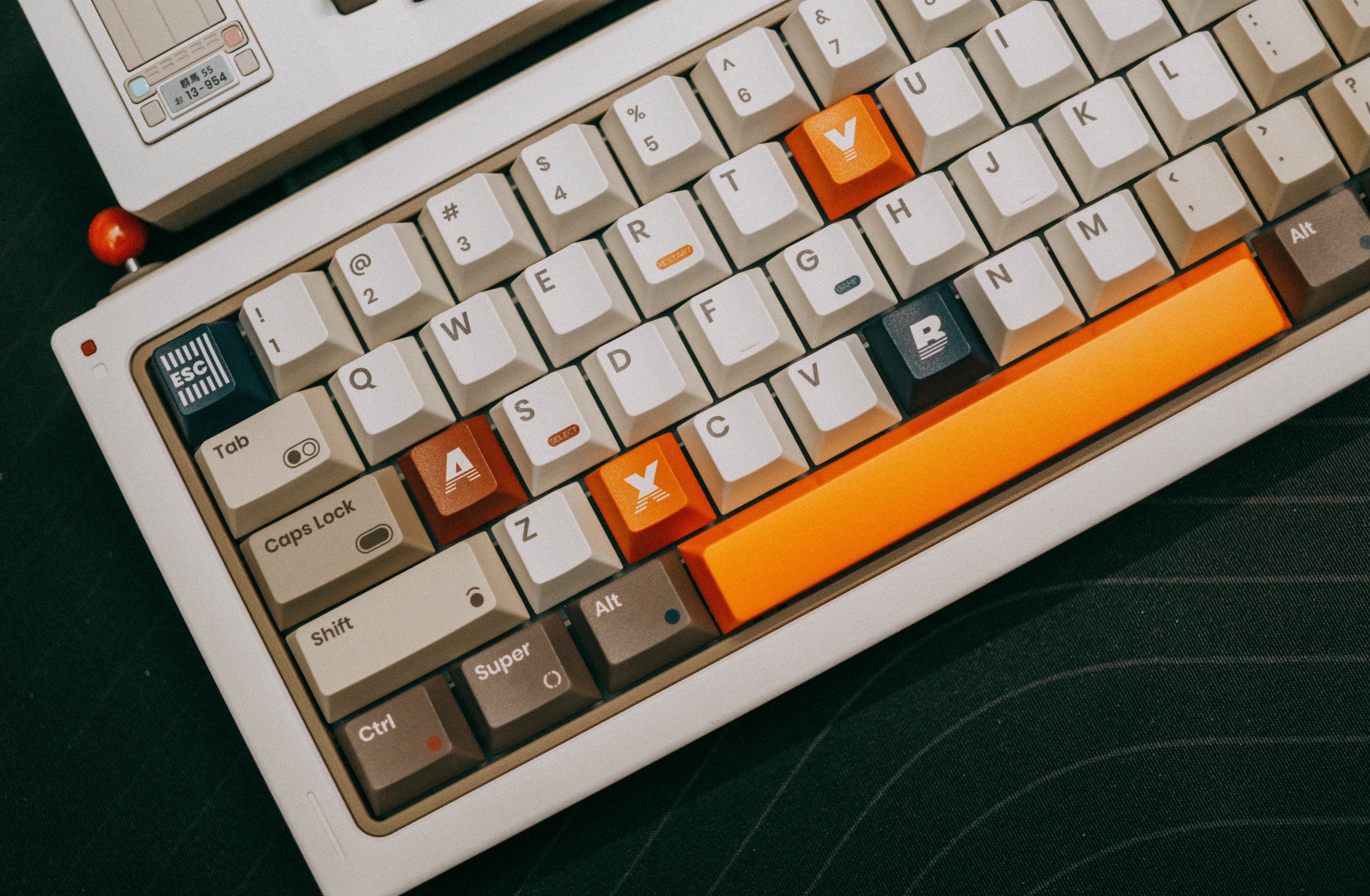 Close-up of Colorful Mechanical Keyboard with Orange Keys · Free Stock ...