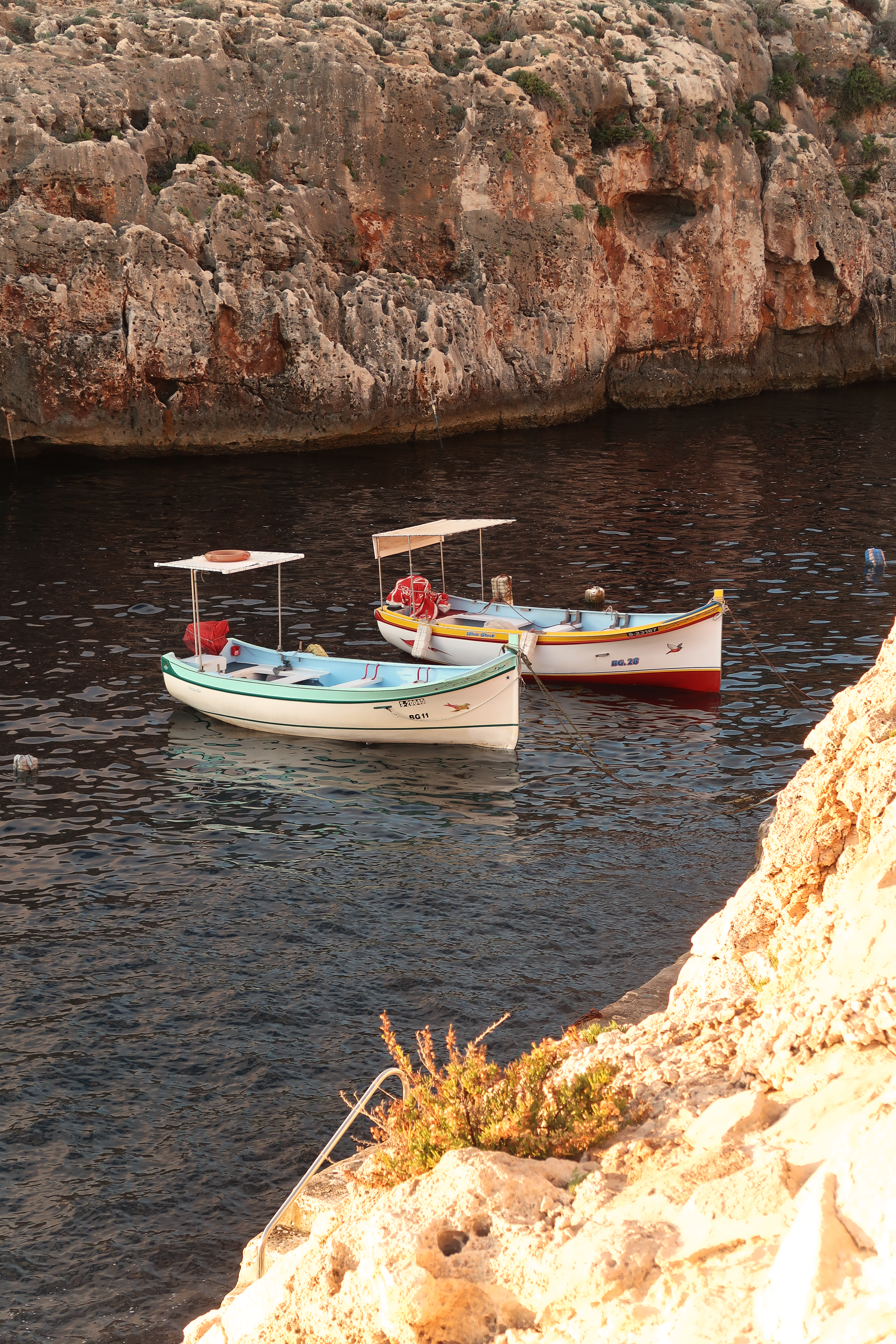 Colorful Maltese Boats at Rest in Scenic Cove · Free Stock Photo