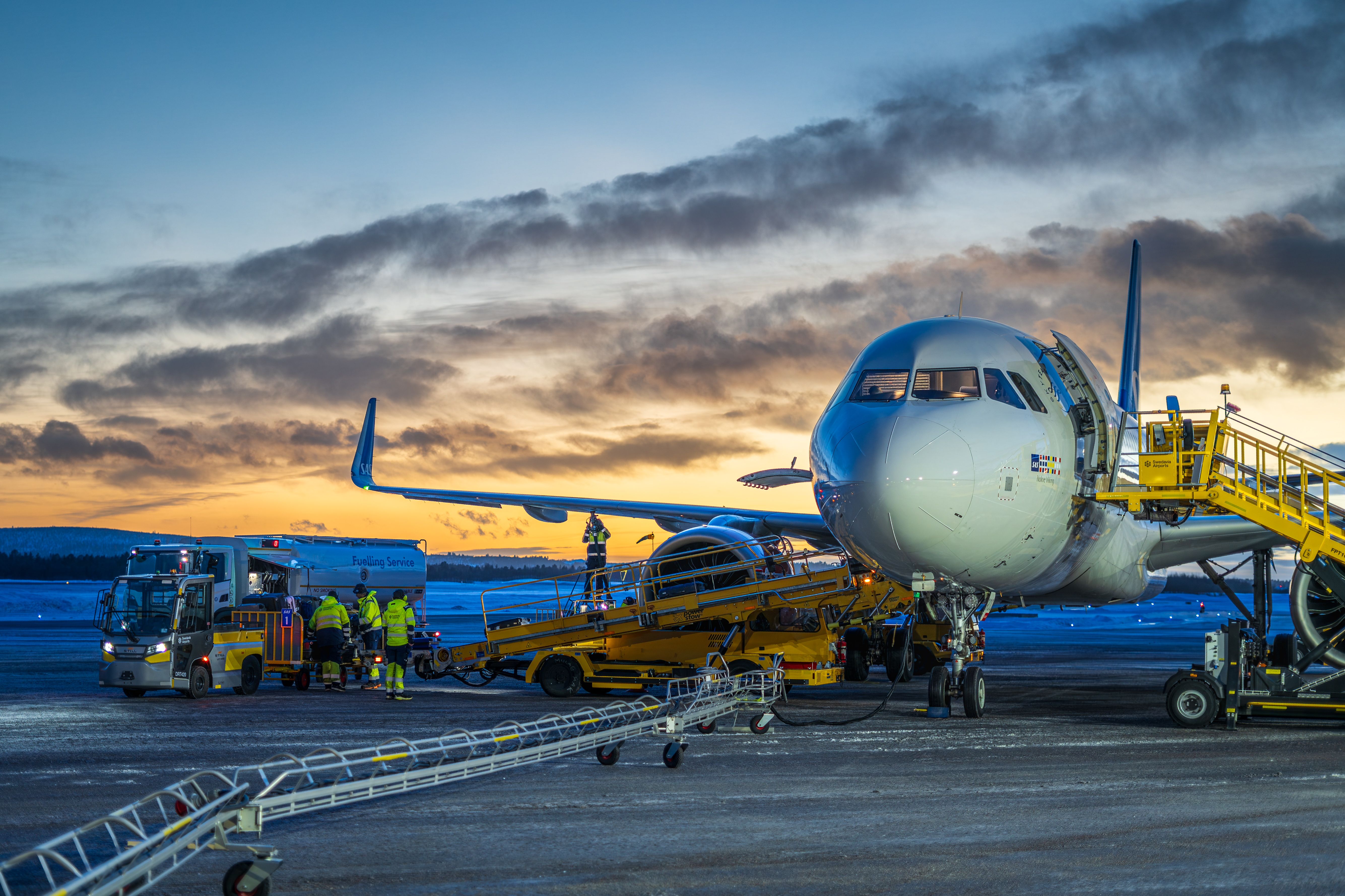 Winter Aircraft Ground Operations in Sweden · Free Stock Photo