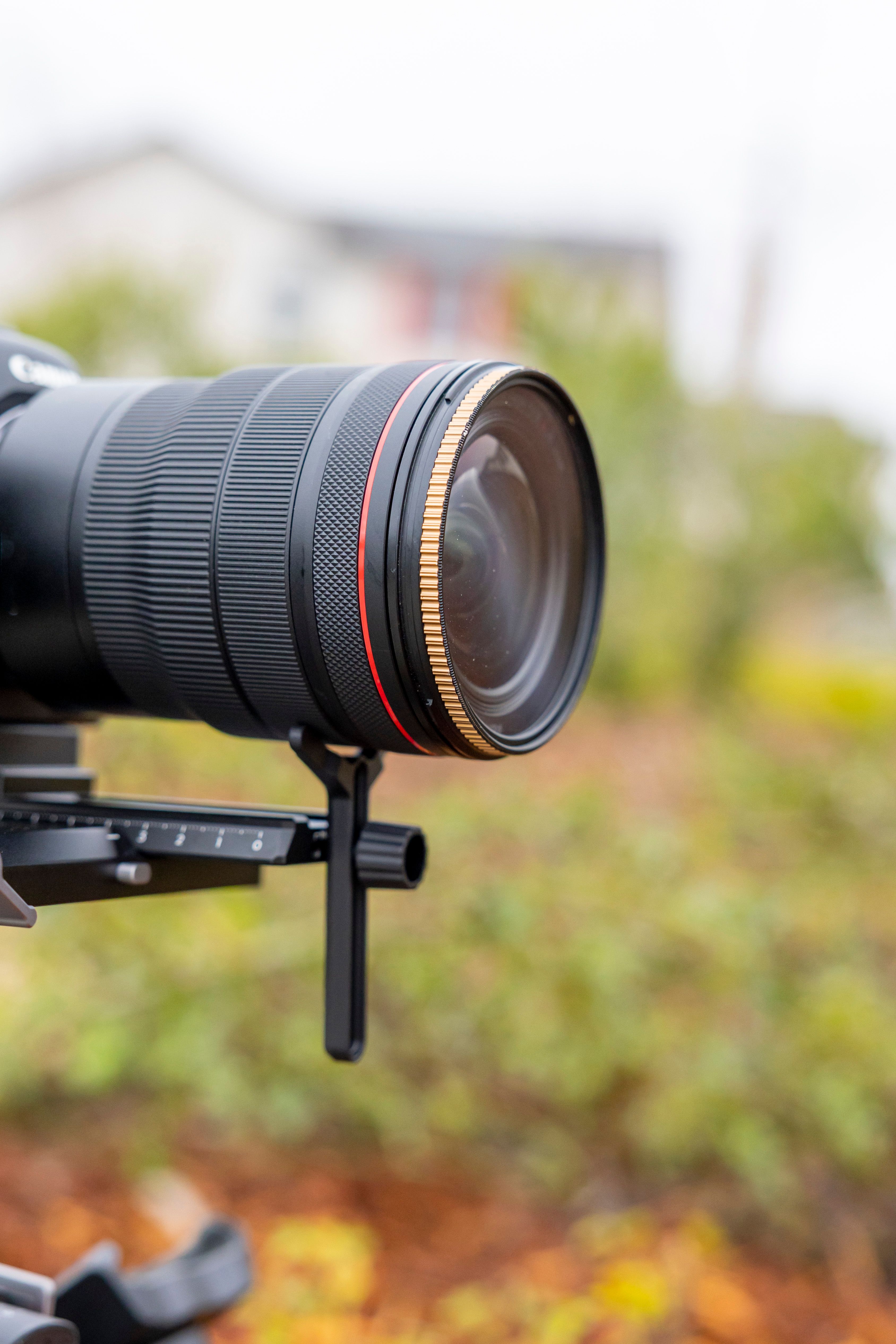 Close-up of Professional Camera Lens Outdoors · Free Stock Photo