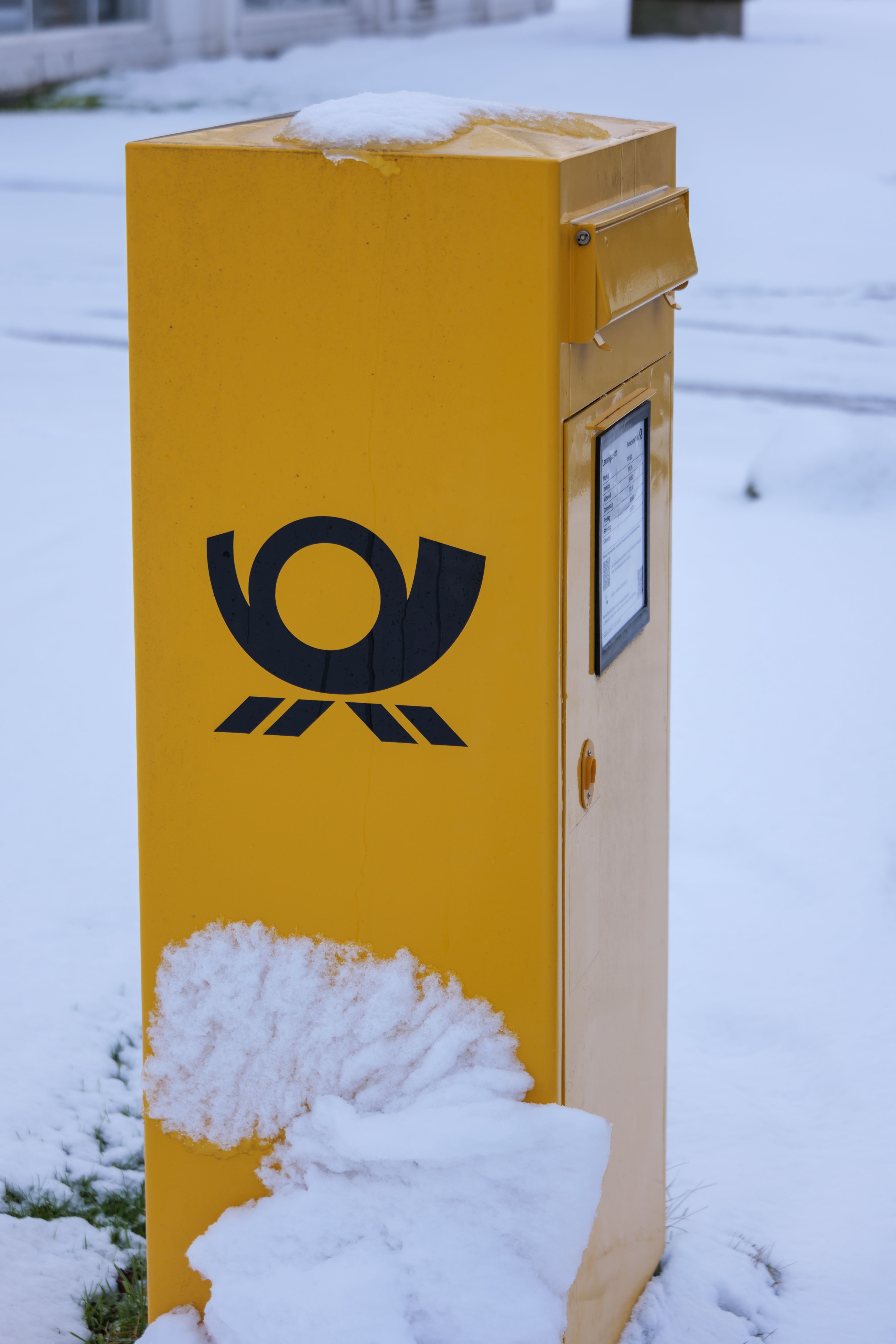 Yellow Postal Box in Snowy Winter Scene · Free Stock Photo