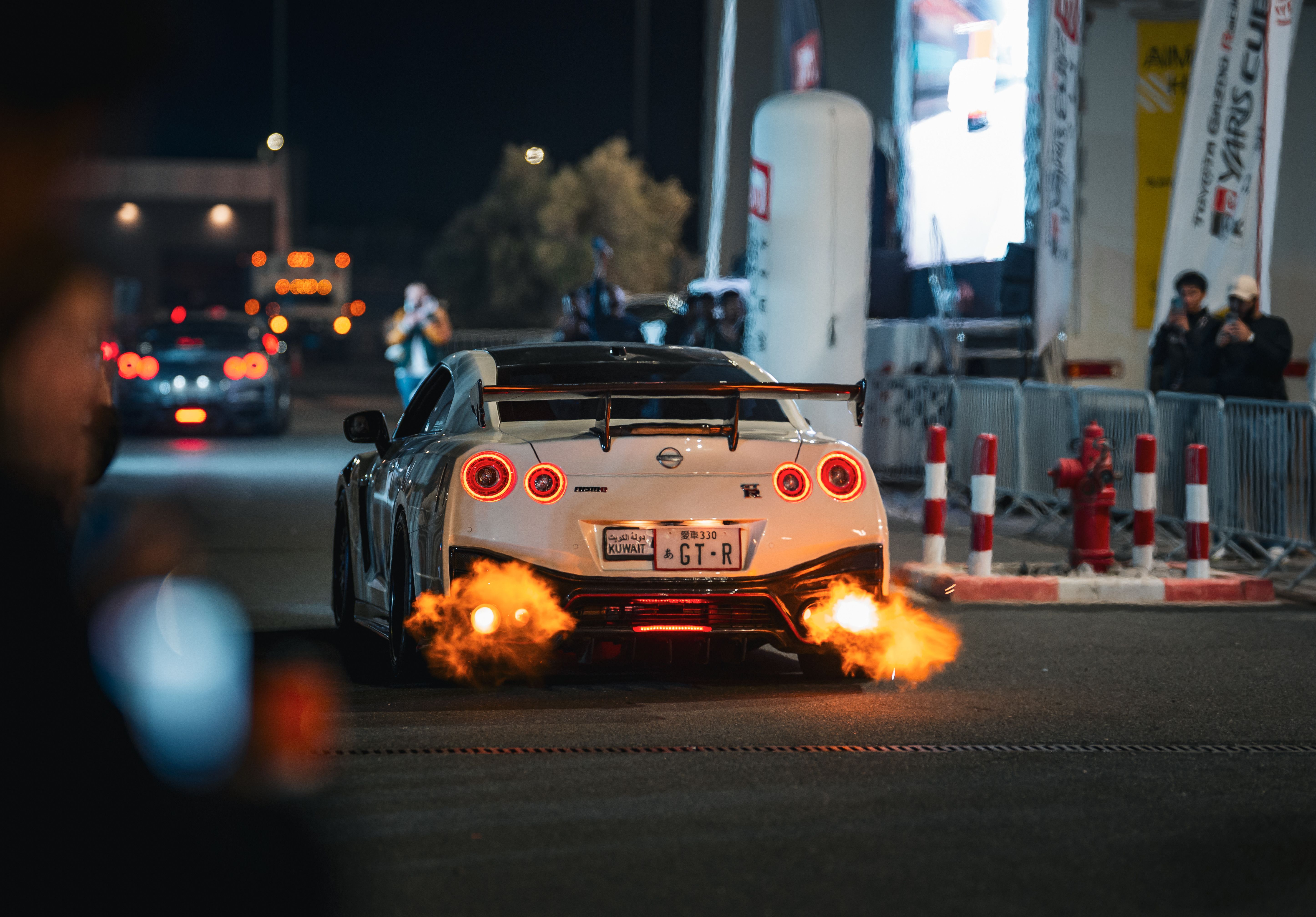 Exciting Nighttime Auto Racing in Kuwait City · Free Stock Photo