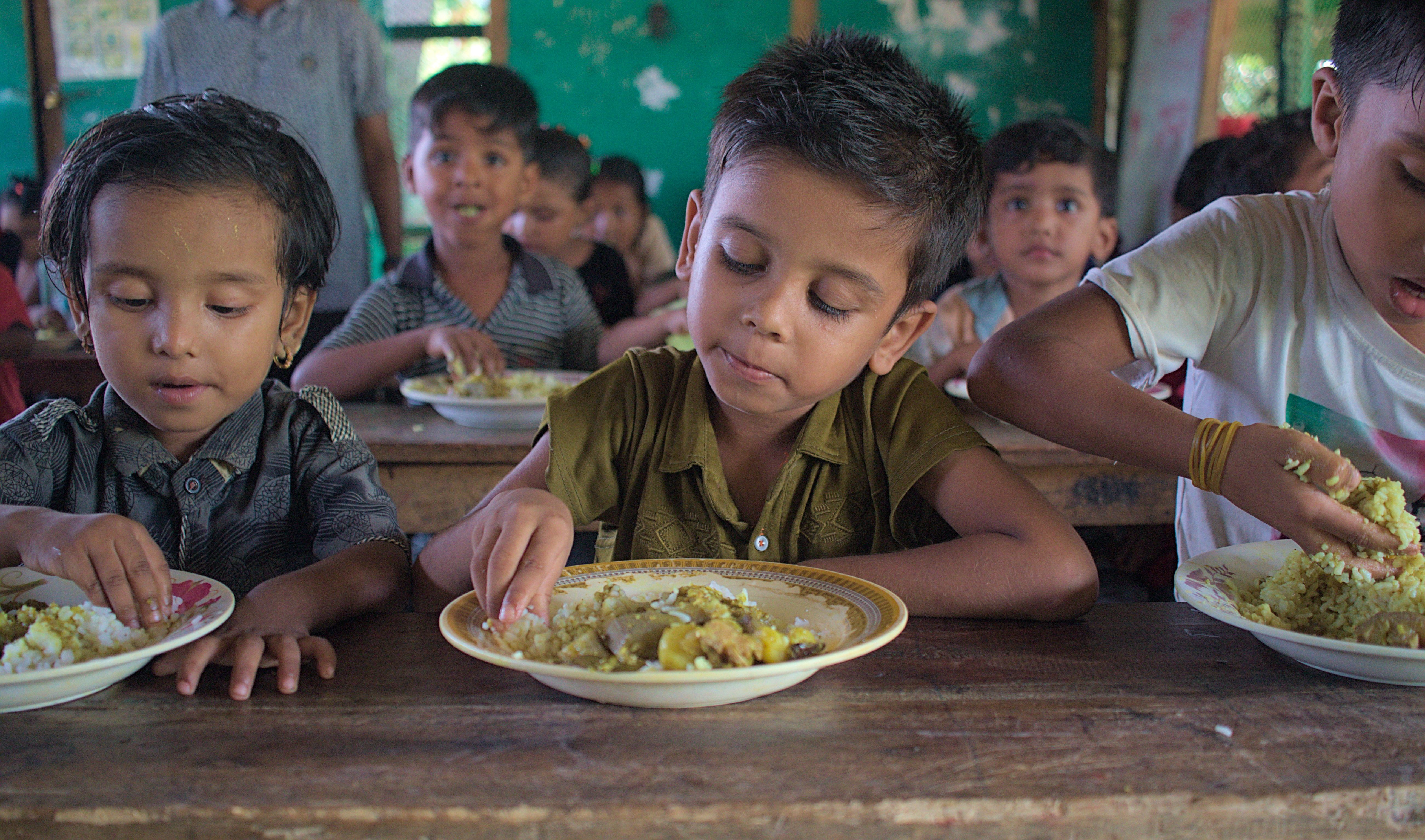 Children Enjoying Lunch in a Classroom Setting · Free Stock Photo
