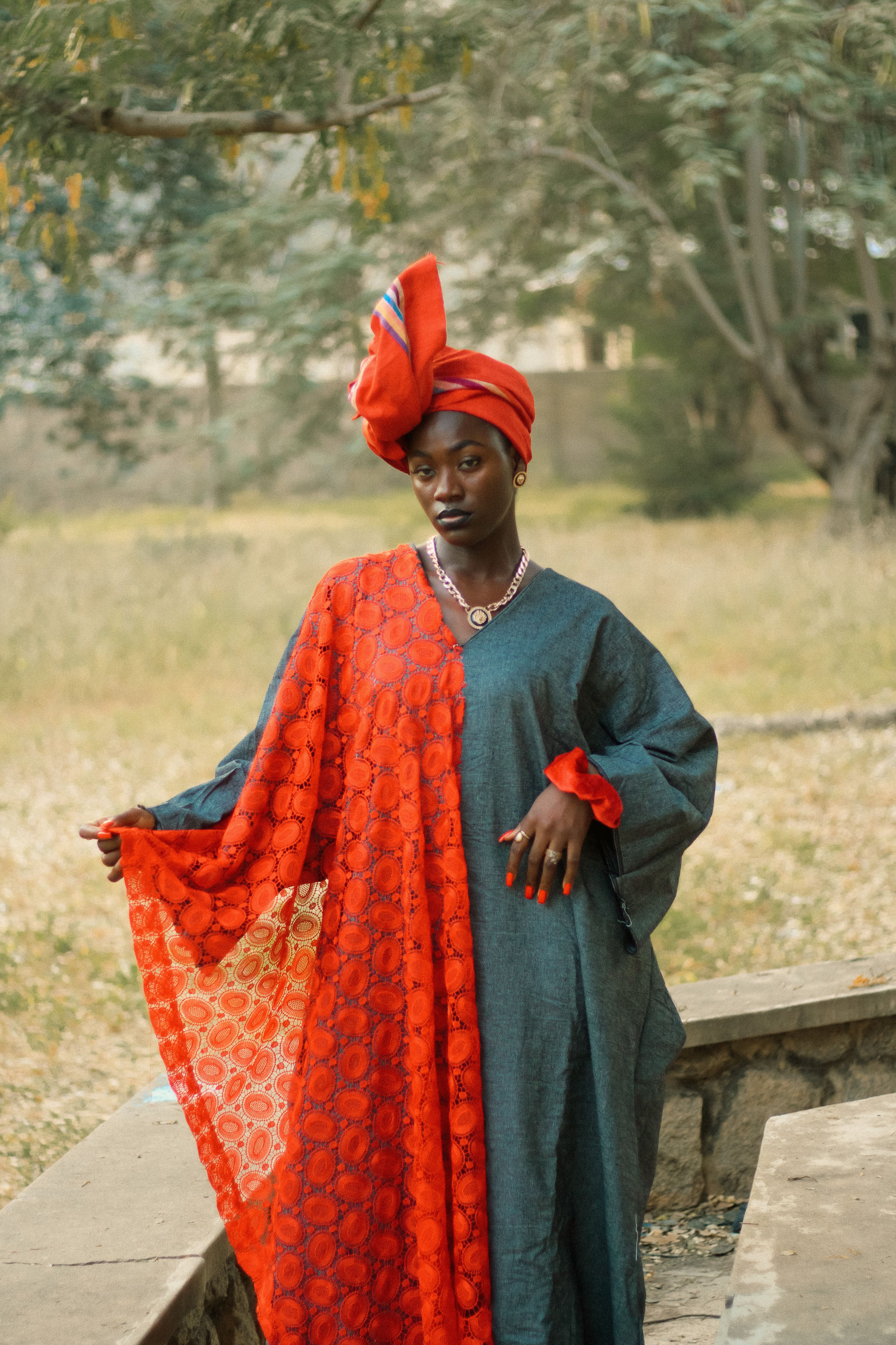 Elegant Woman in Traditional African Attire Outdoors · Free Stock Photo