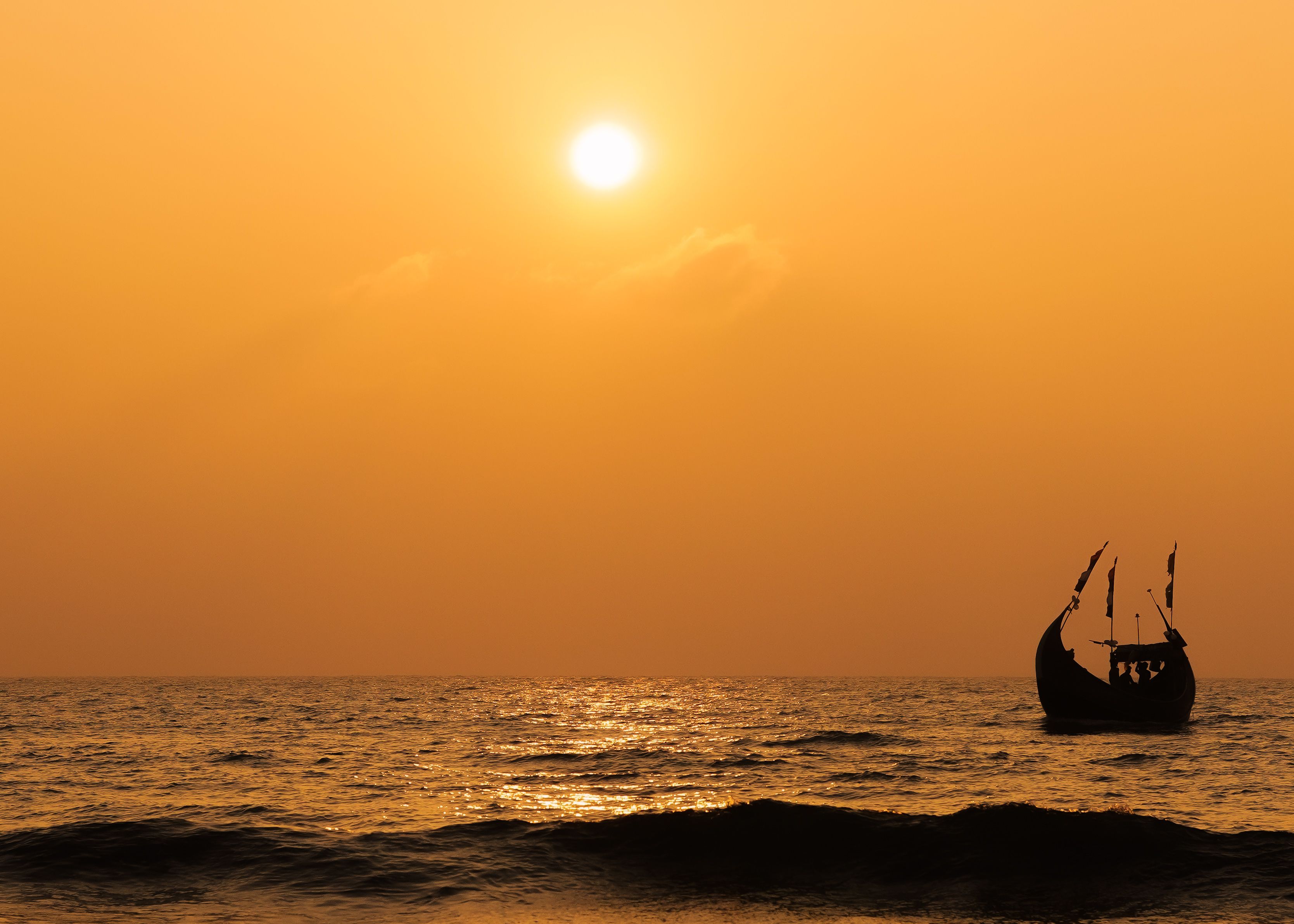 Traditional Fishing Boat at Sunset in Cox's Bazar · Free Stock Photo