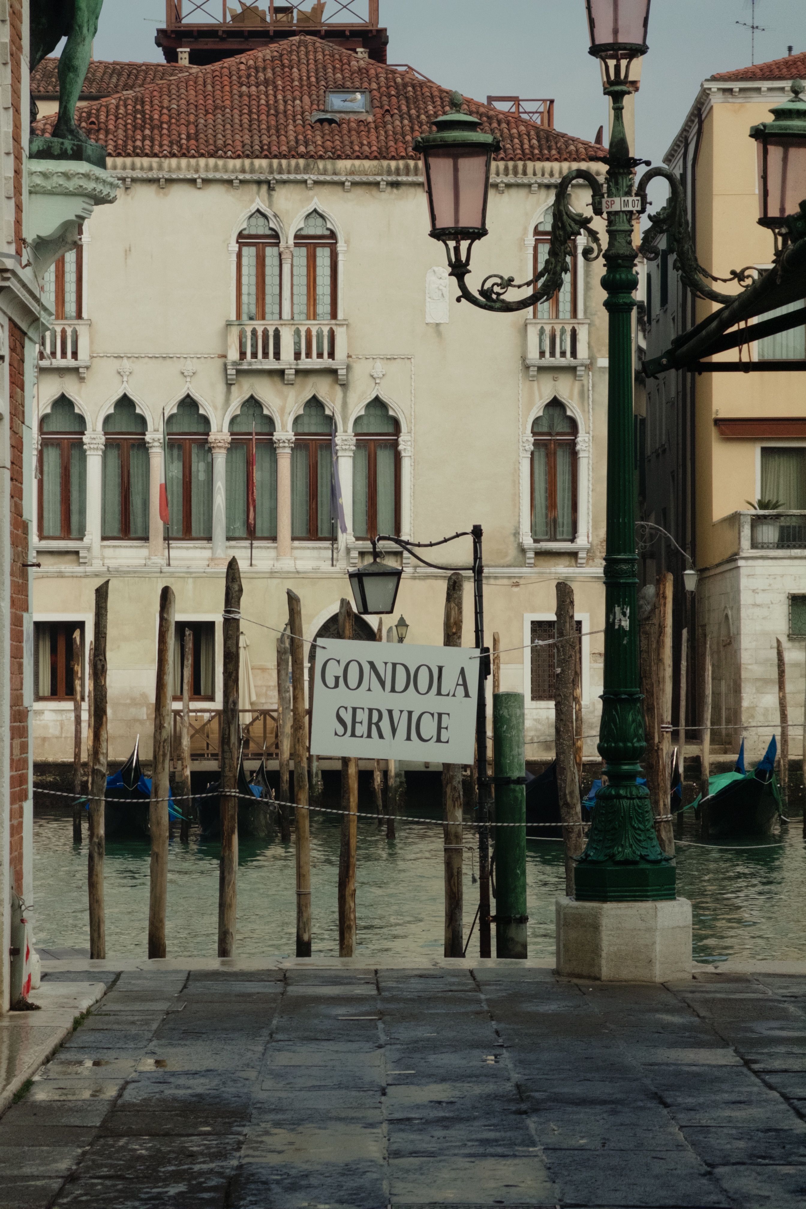 Venice Gondola Service with Historic Canal View · Free Stock Photo