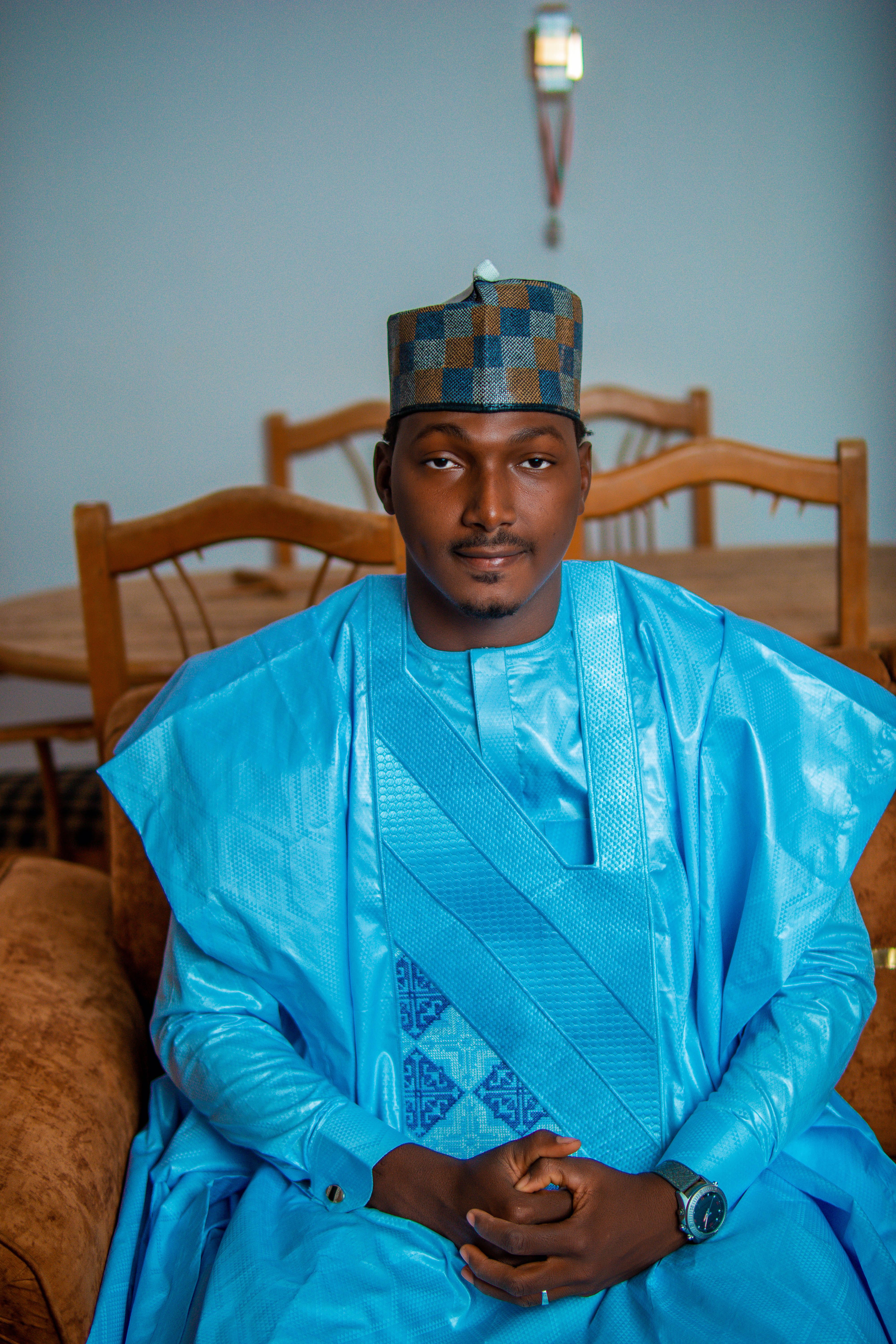 Elegant Man in Traditional Blue Attire · Free Stock Photo