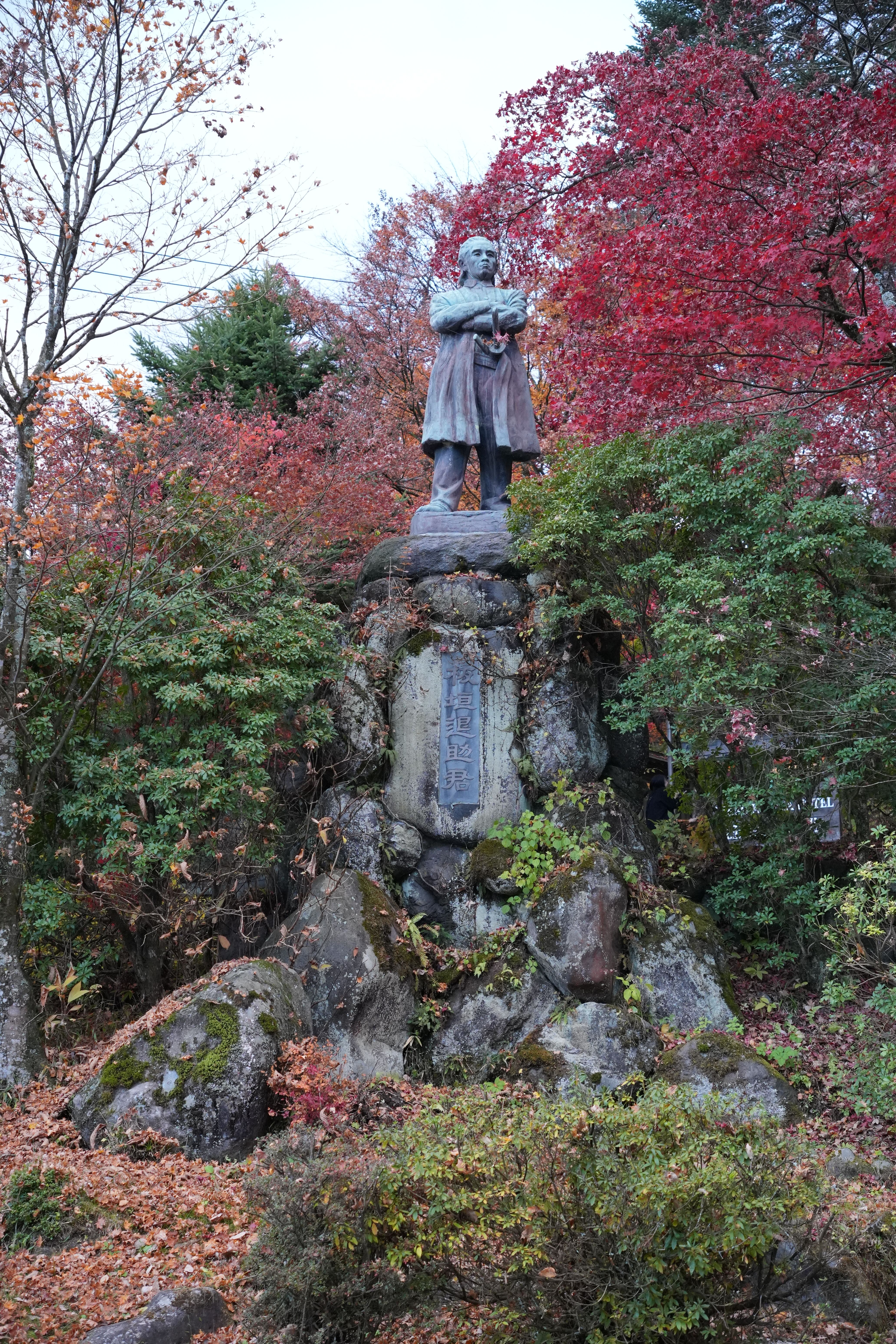 Statue Amidst Autumn Foliage in Nikko, Japan · Free Stock Photo