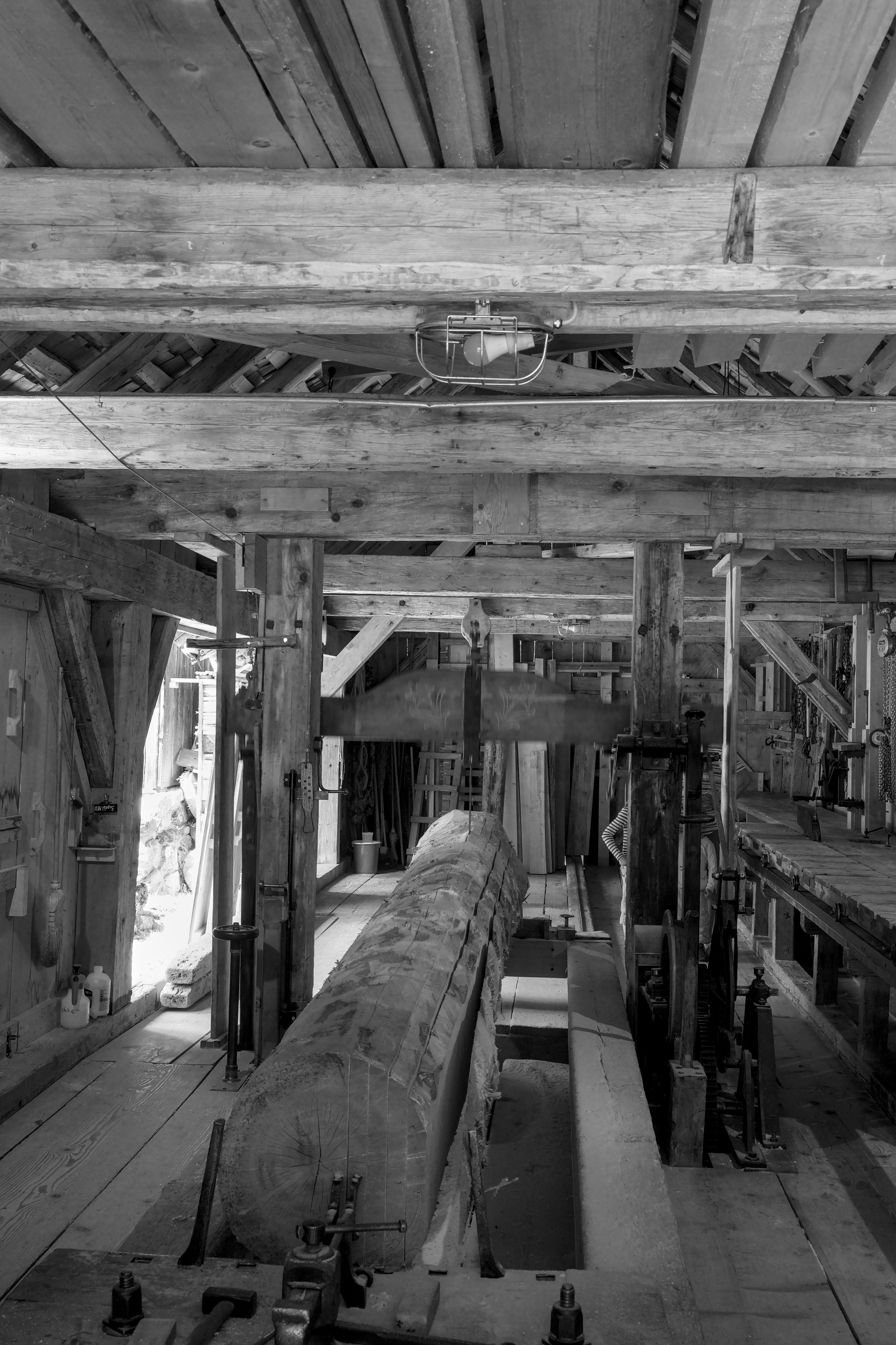 Historic Swiss Sawmill Interior in Black and White · Free Stock Photo