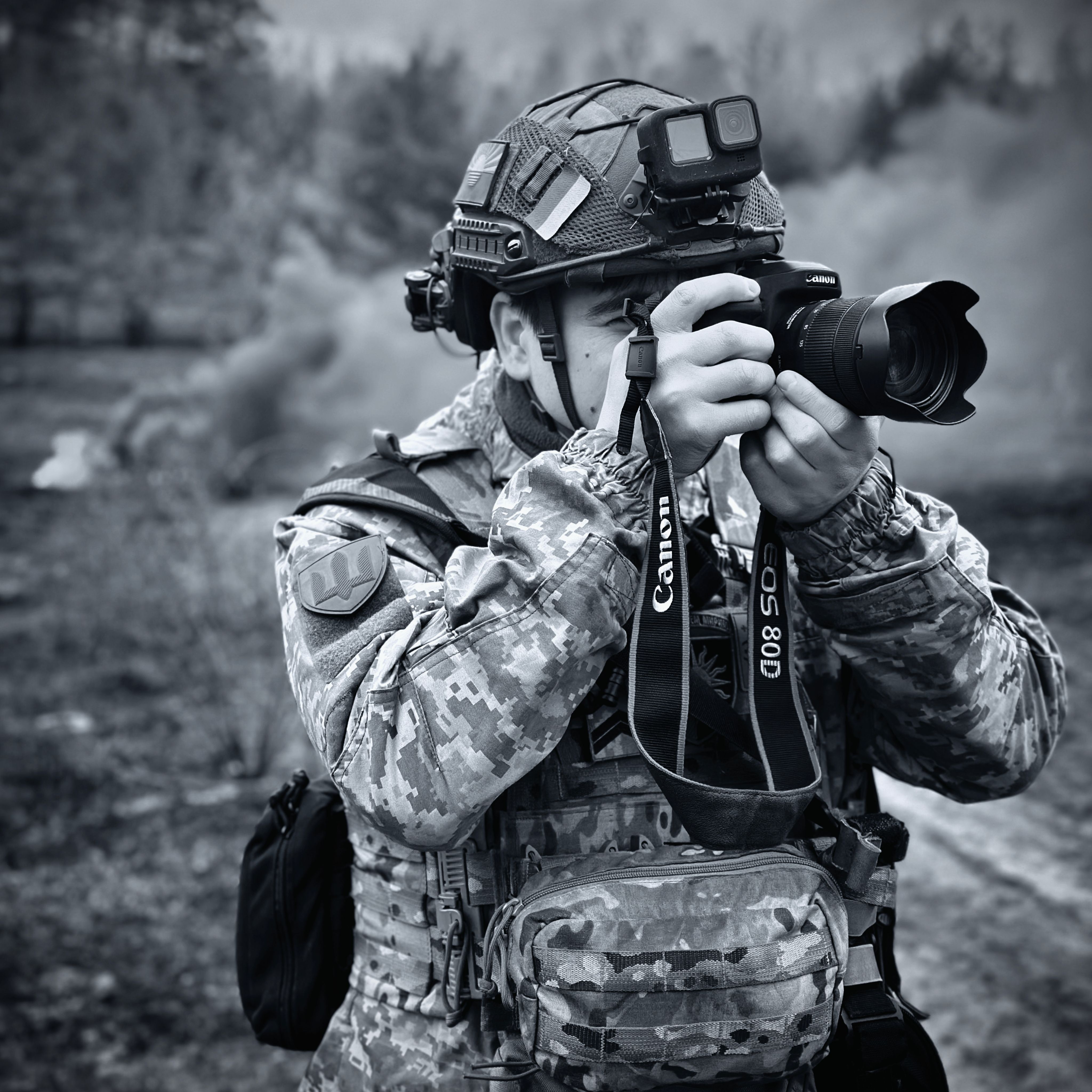 Military Photographer in Action Capturing Scenes · Free Stock Photo
