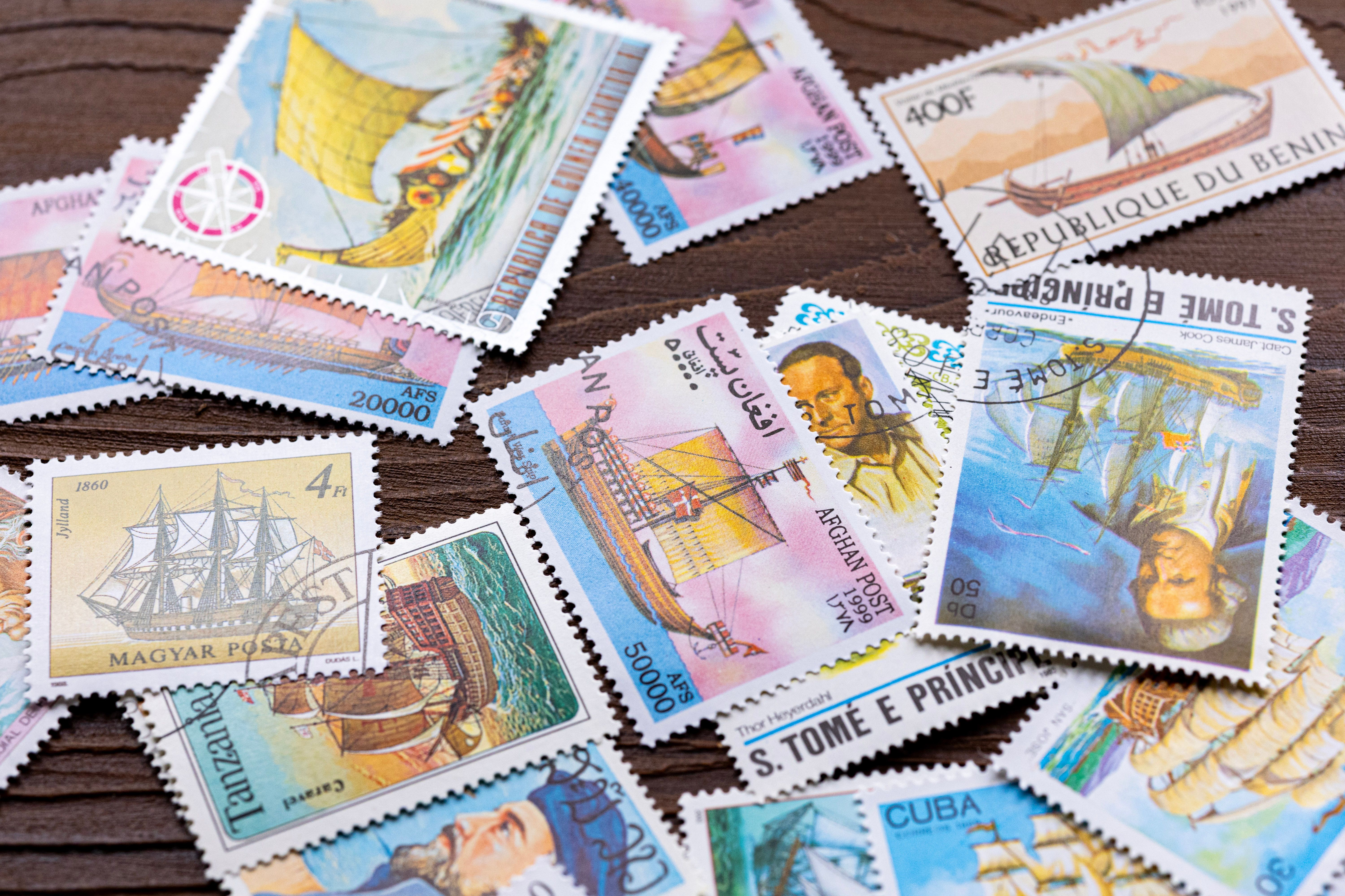 Collection of Vintage Stamps with Historical Ship Themes · Free Stock Photo