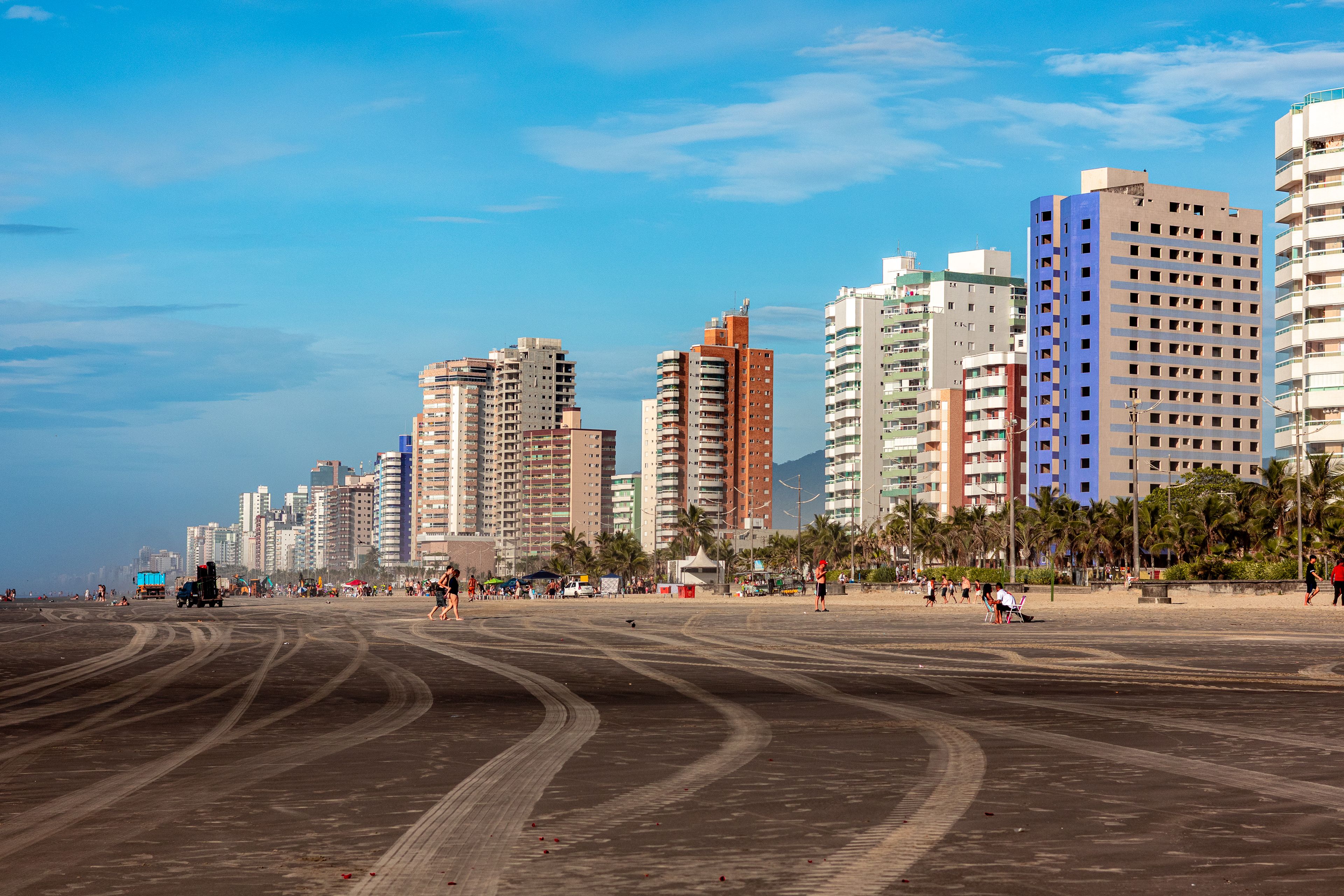 Scenic Urban Beachfront with High-Rise Buildings · Free Stock Photo